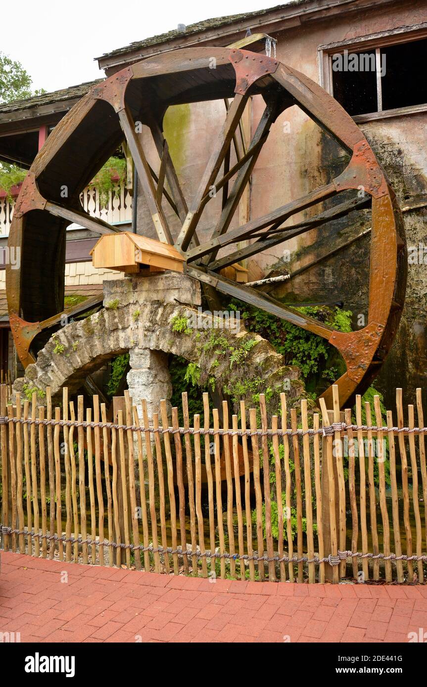 A close up of an old water mill in the Colonial Quarter beside the ...
