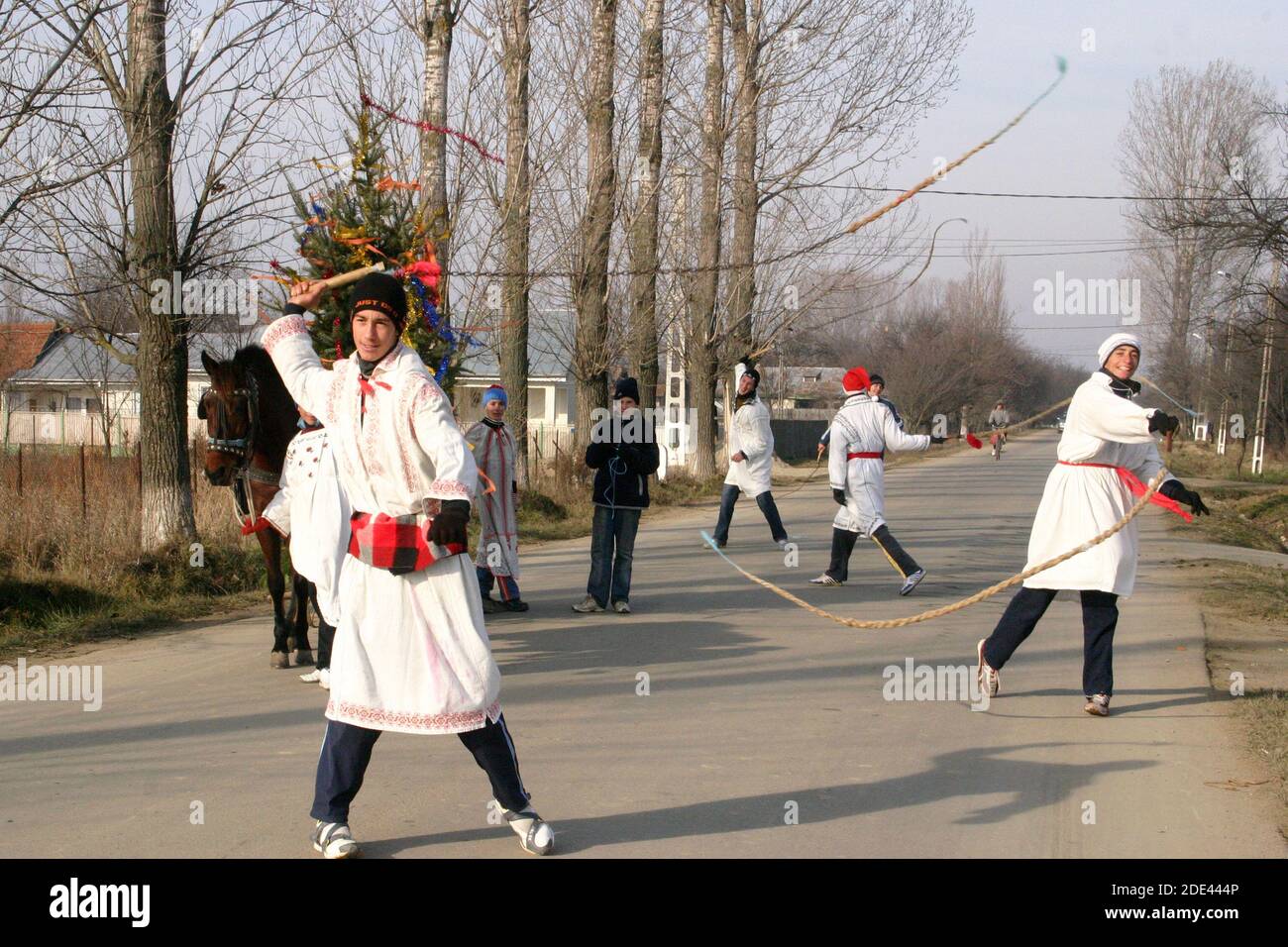 Muntenia, Romania. Young boys caroling. "Plugusorul", an agrarian carol ...