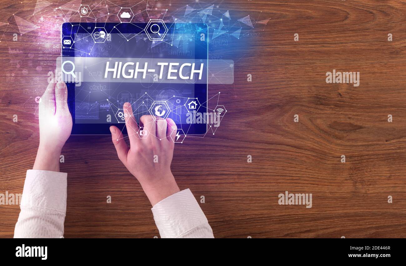 Close-up of a tablet searching HIGH-TECH inscription, hi-tech computing ...