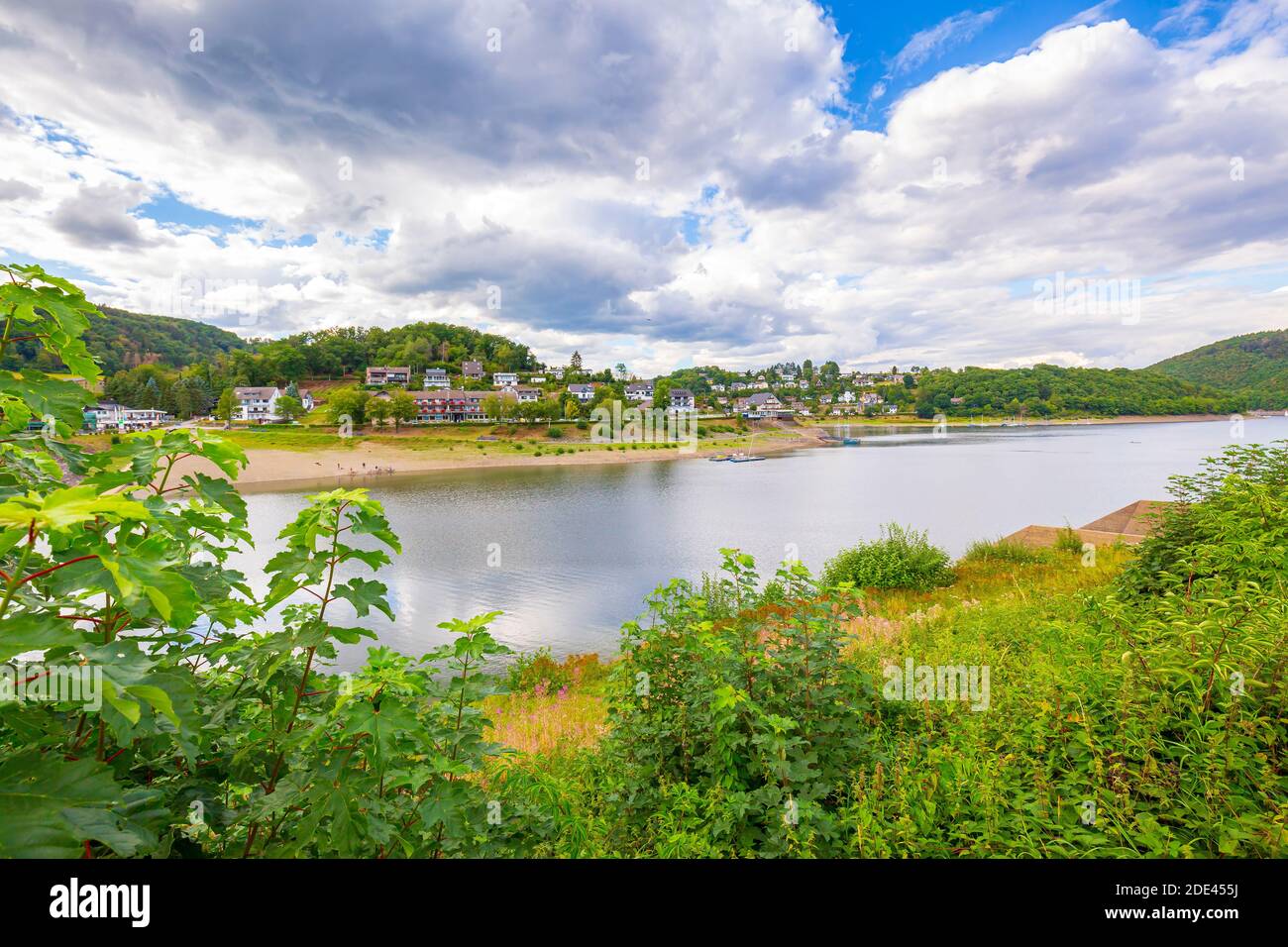 Rurberg and Rursee on a beautiful day in summer. Touristic landmark for ...