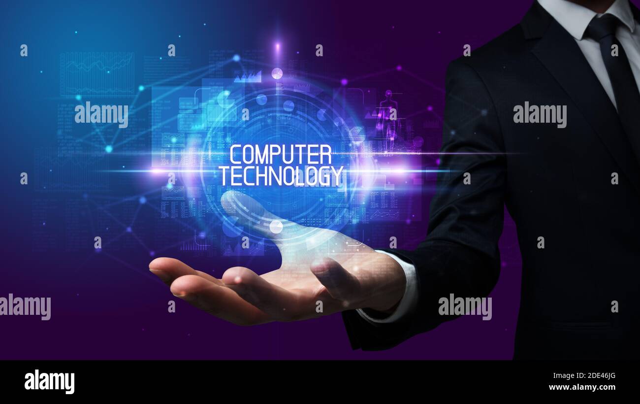 Man hand holding COMPUTER TECHNOLOGY inscription, technology concept ...