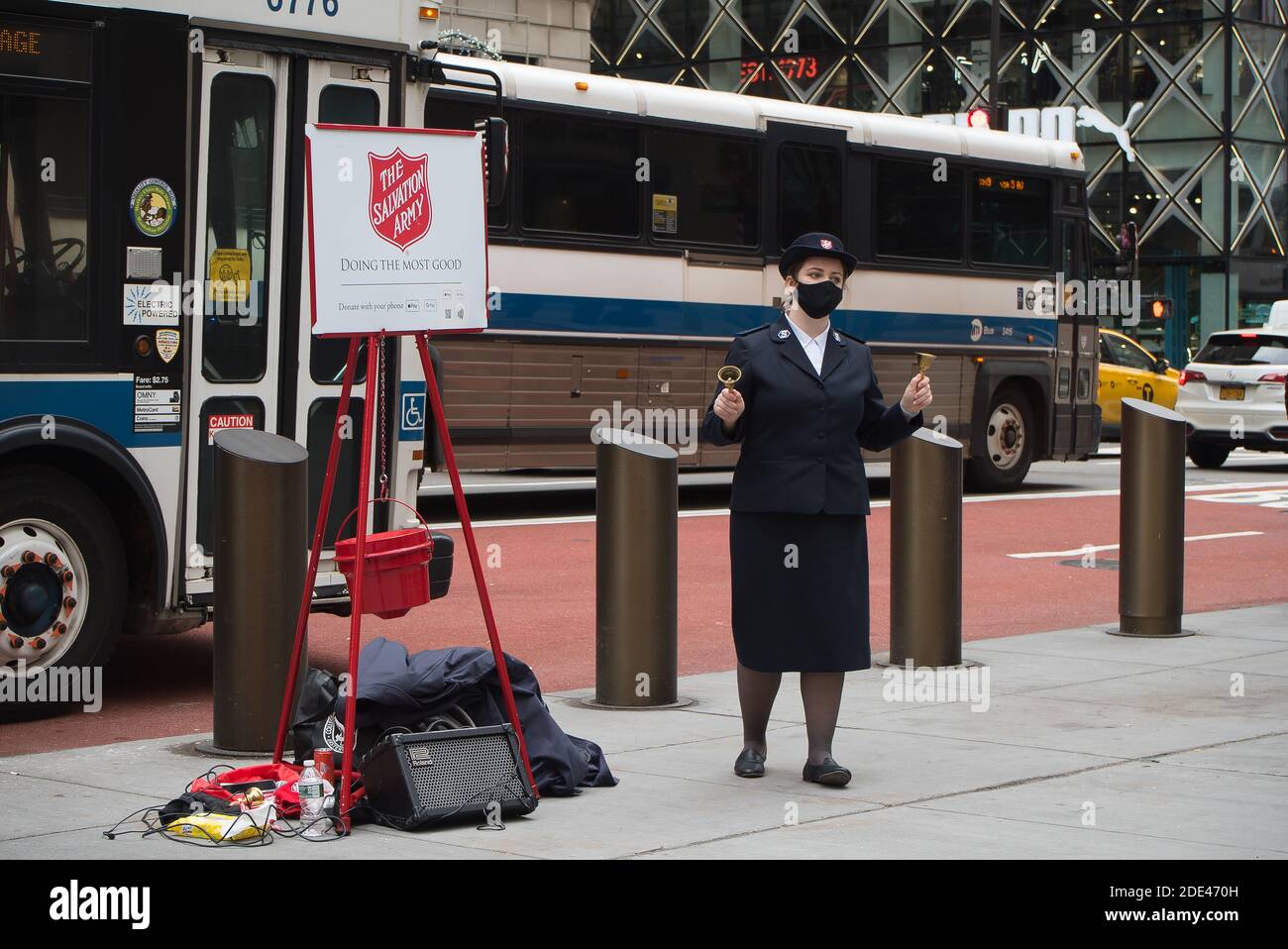 Manhattan, New York. November 27, 2020. A Salvation Army "bell ringer ...