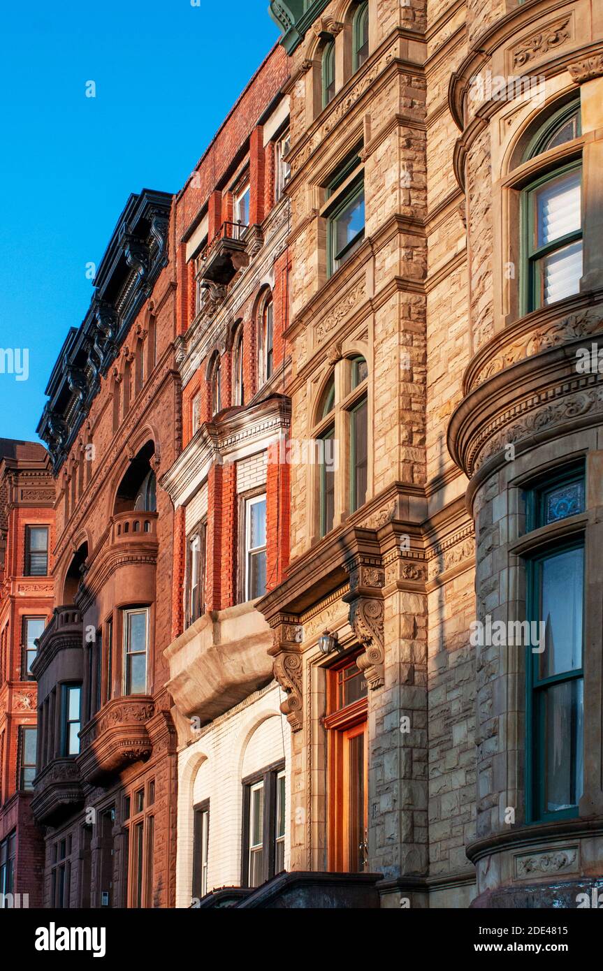 Fire escapes on tenement apartment buildings in Harlem neighborhood ...