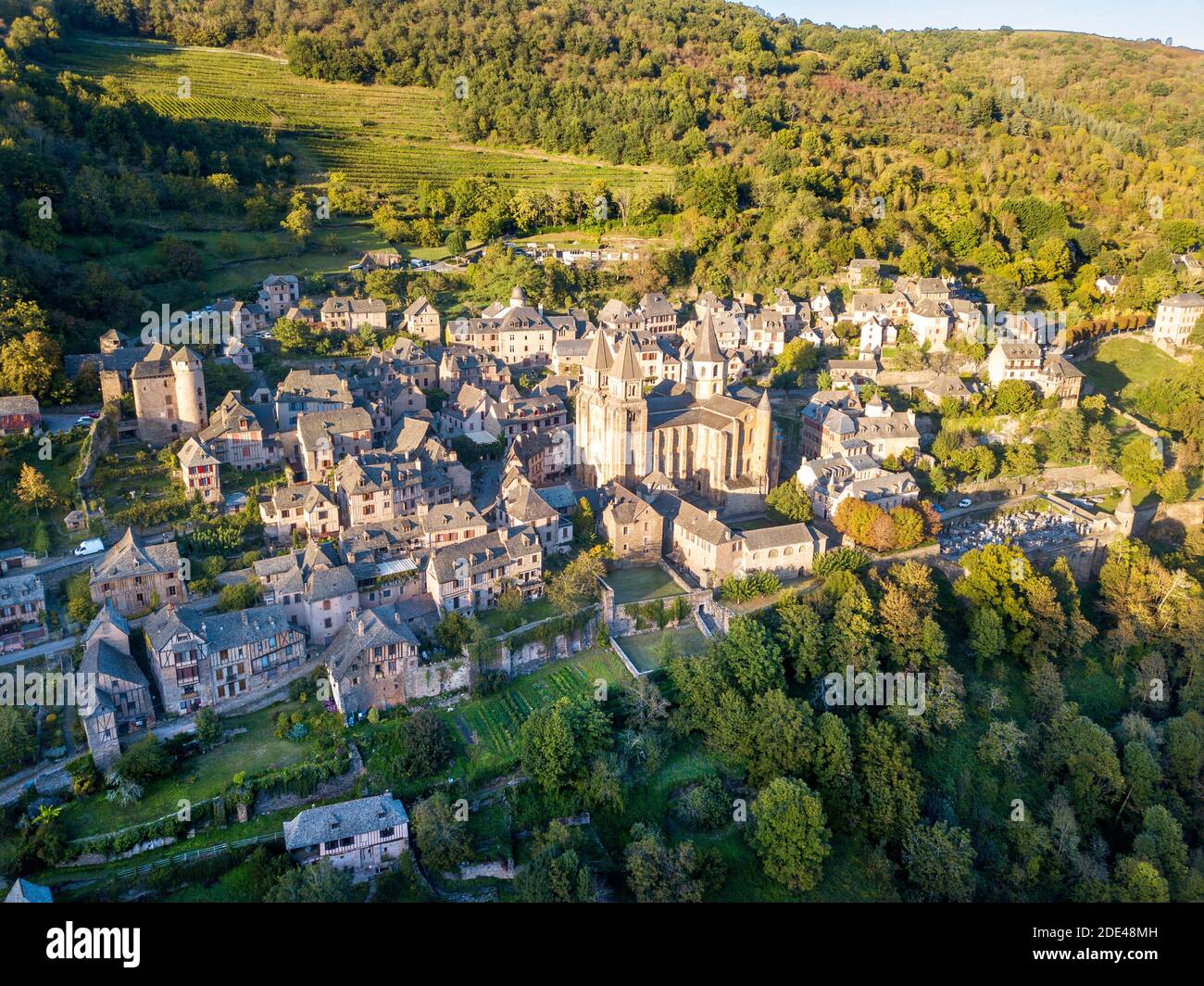 Aerial view of the medieval village of Conques in France. It shows ...