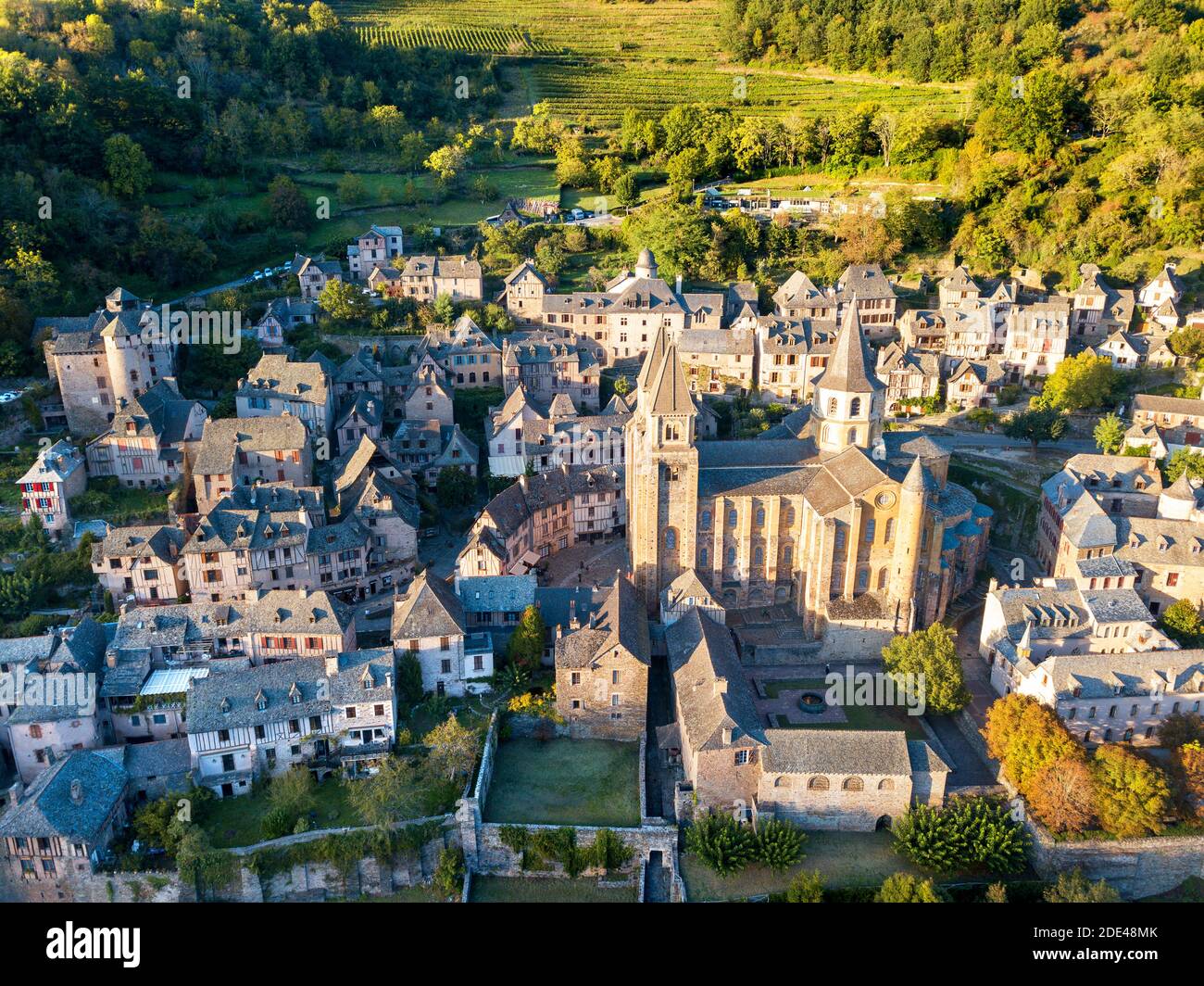 Aerial view of the medieval village of Conques in France. It shows ...