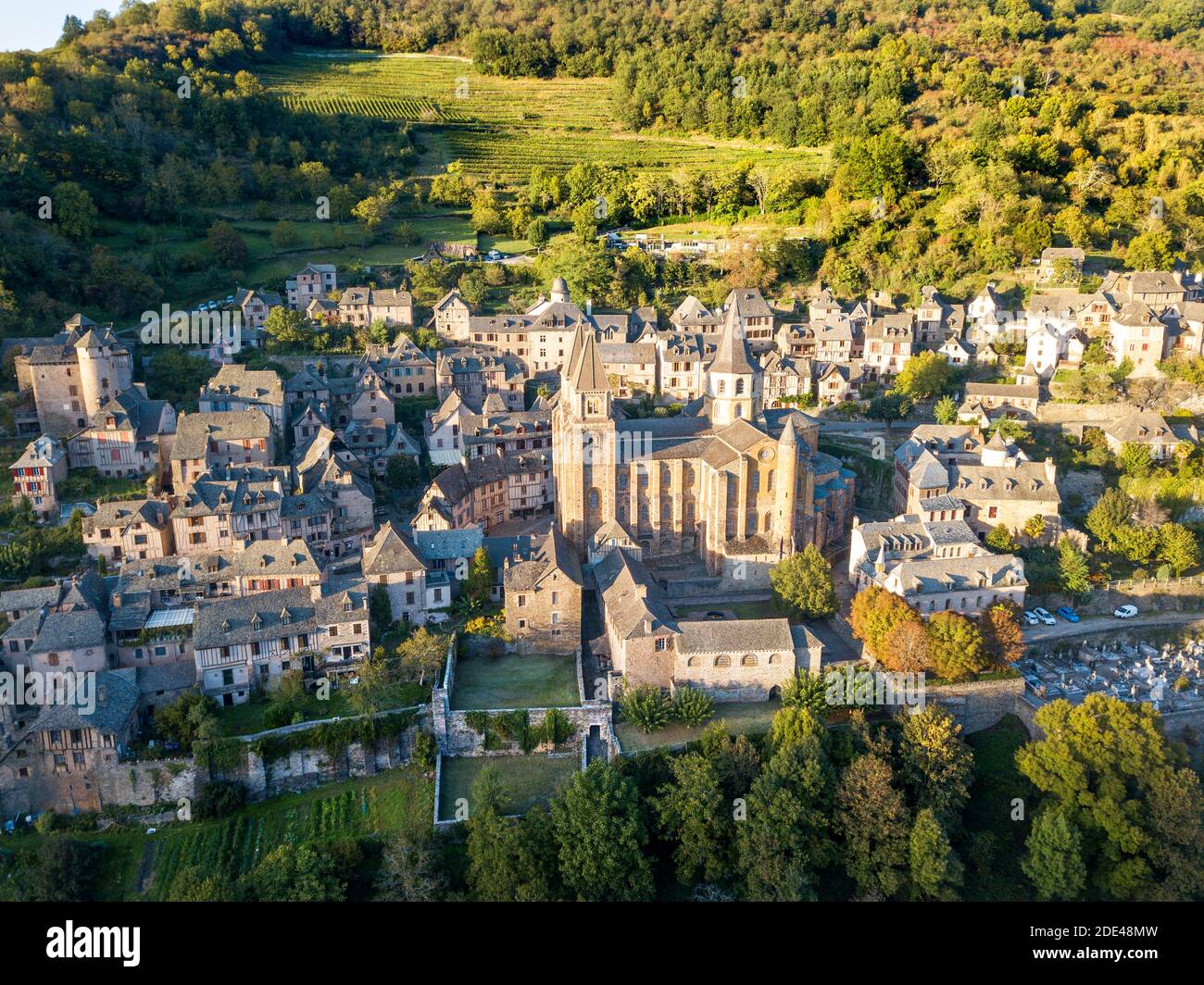 Aerial view of the medieval village of Conques in France. It shows ...