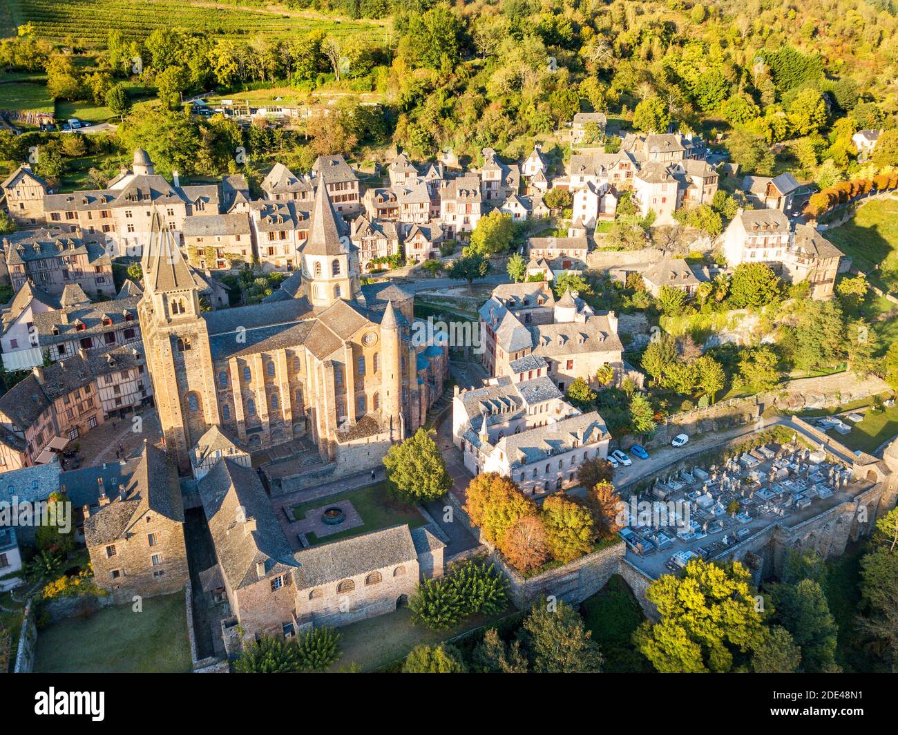 Aerial view of the medieval village of Conques in France. It shows ...