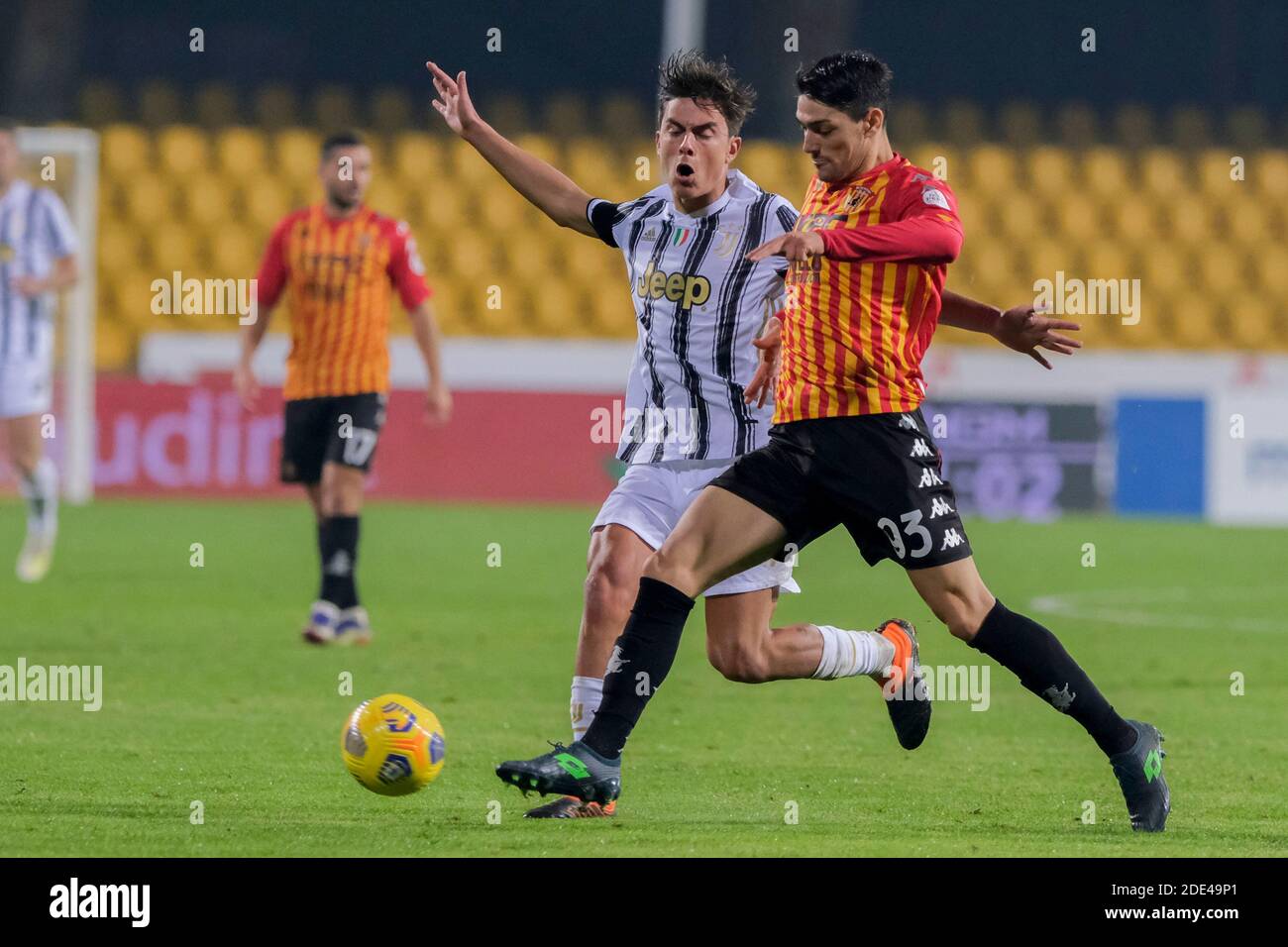 Juventus's Argentinian striker Paulo Dybala (L) challenges for the ball ...