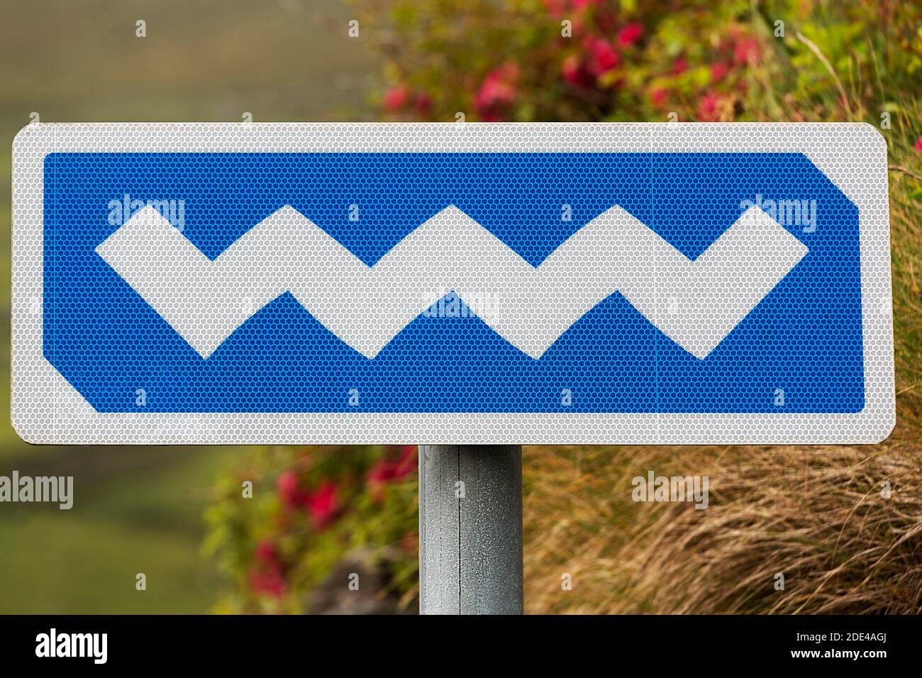 Blue and white sign with wavy logo marks Irish coastal road Wild ...