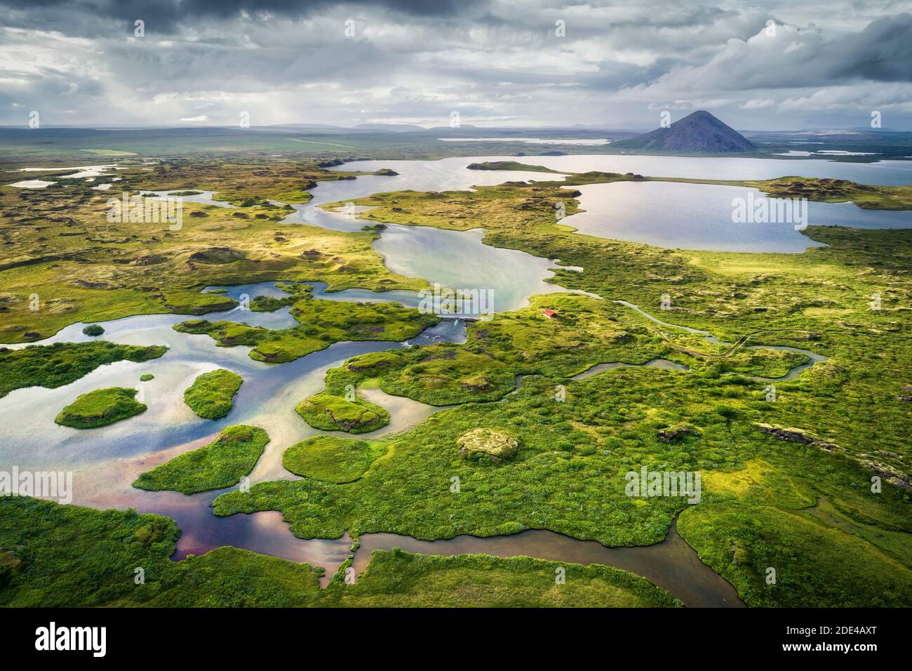 Finely structured landscape with green vegetation and small lakes and ...