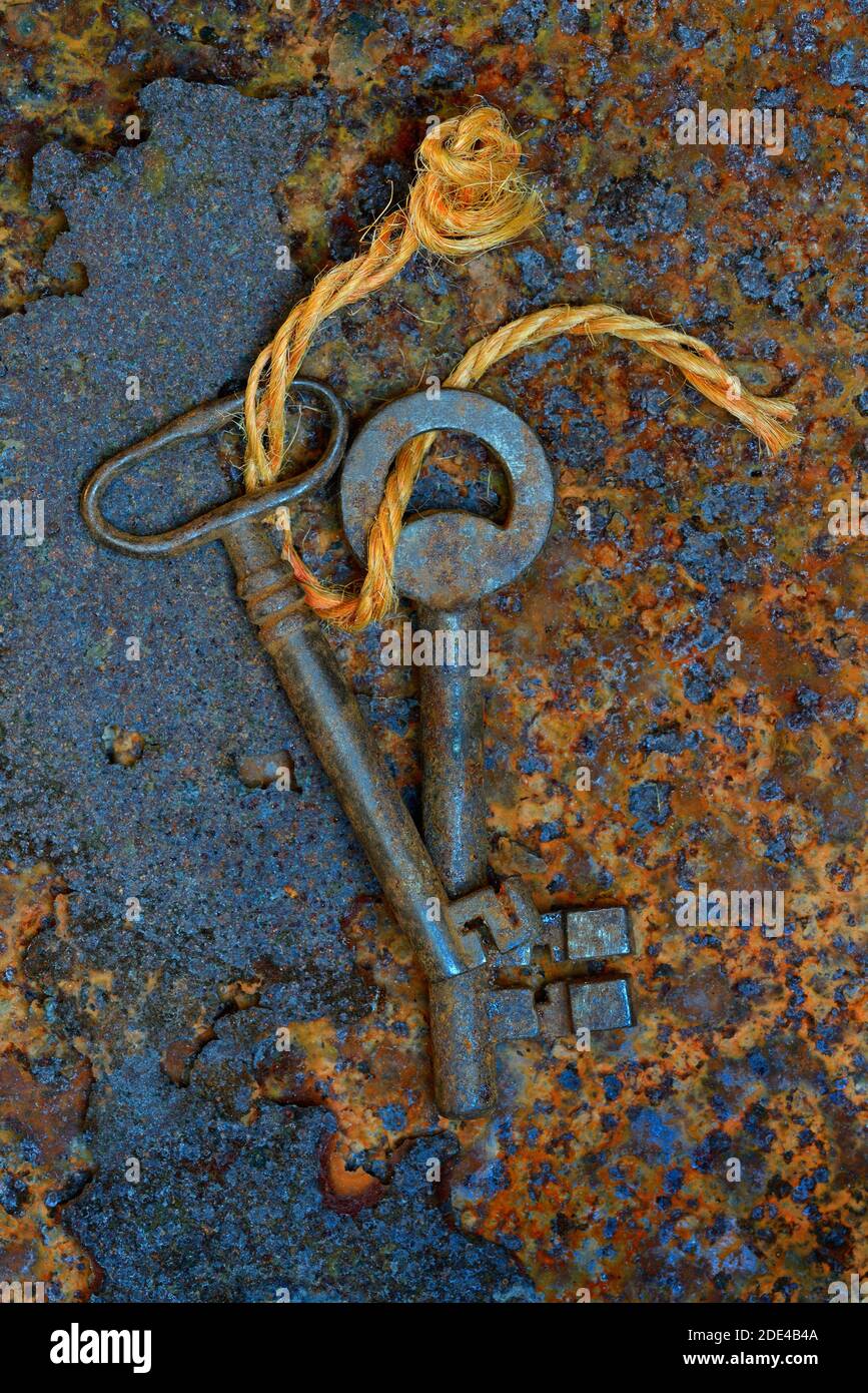 Two old keys on rusty sheet metal, Germany Stock Photo - Alamy