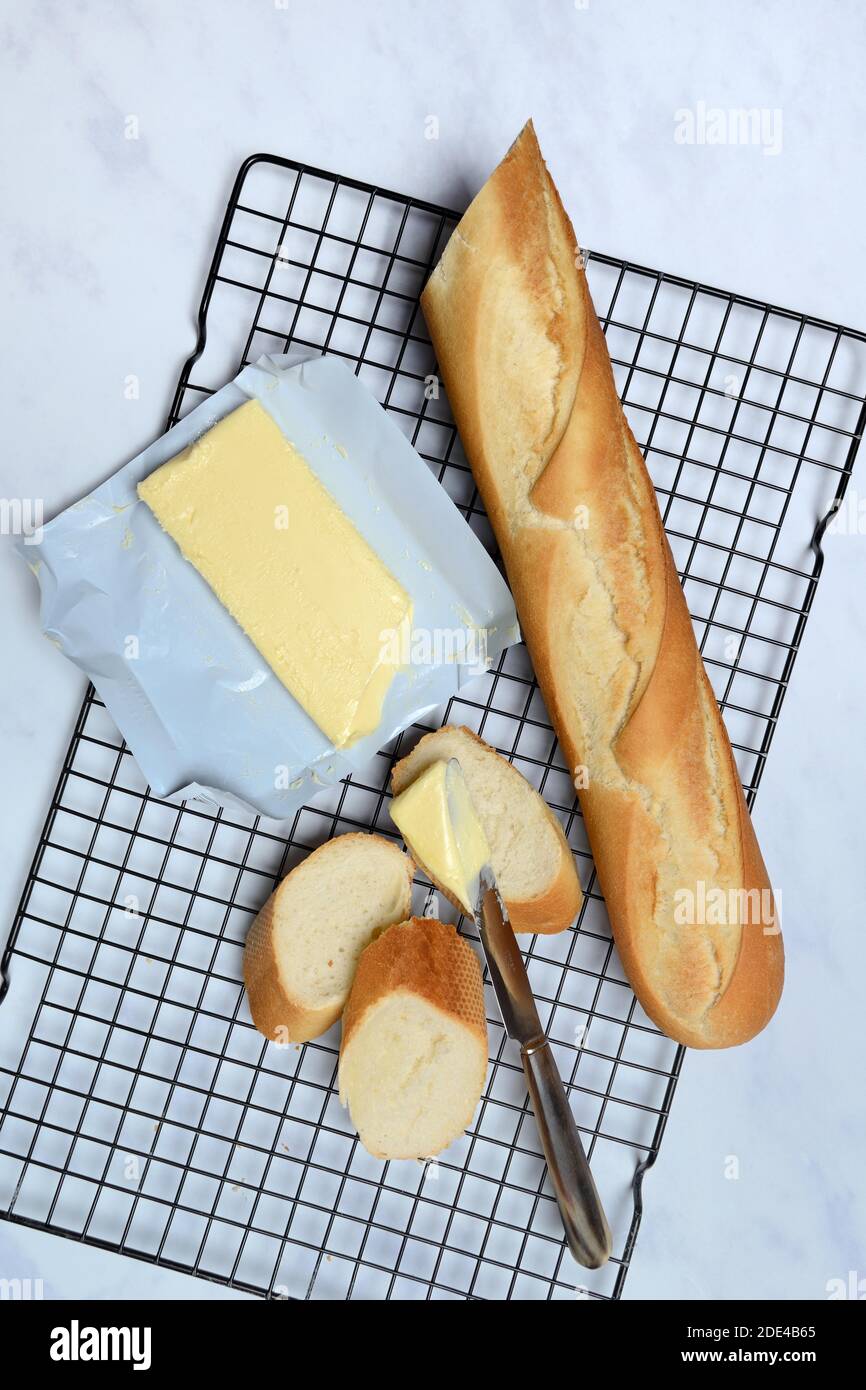 Baguette, baguette slices and butter, Germany Stock Photo - Alamy