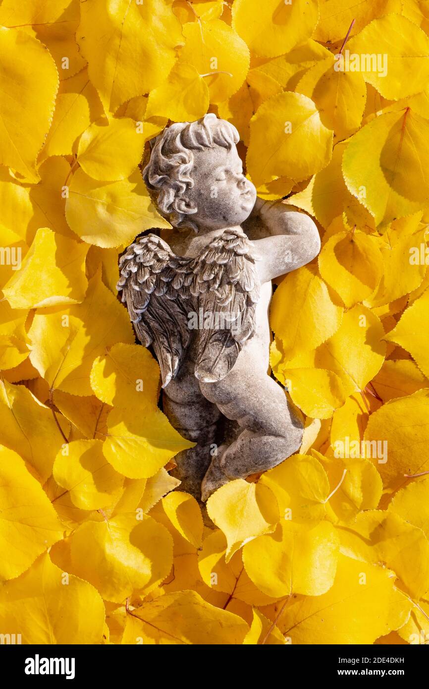 Angel figure lies in hi-res stock photography and images - Alamy