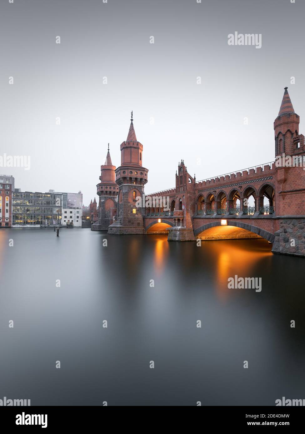 Oberbaum bridge across the Spree, connecting the Berlin districts of ...