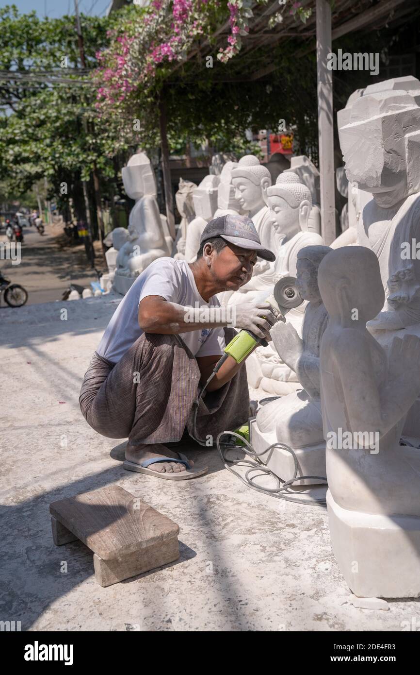 Man makes white Buddhist statues, Mandalay, Myanmar Stock Photo - Alamy