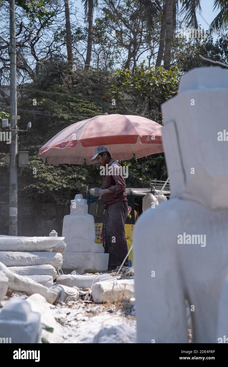 Man makes white Buddhist statues, Mandalay, Myanmar Stock Photo - Alamy