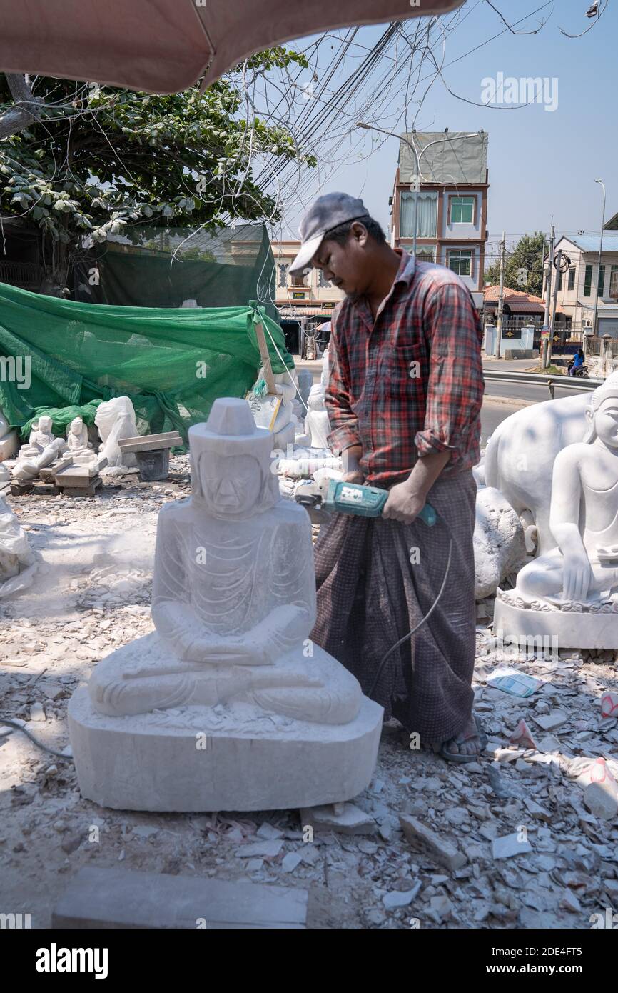 Man makes white Buddhist statues, Mandalay, Myanmar Stock Photo - Alamy