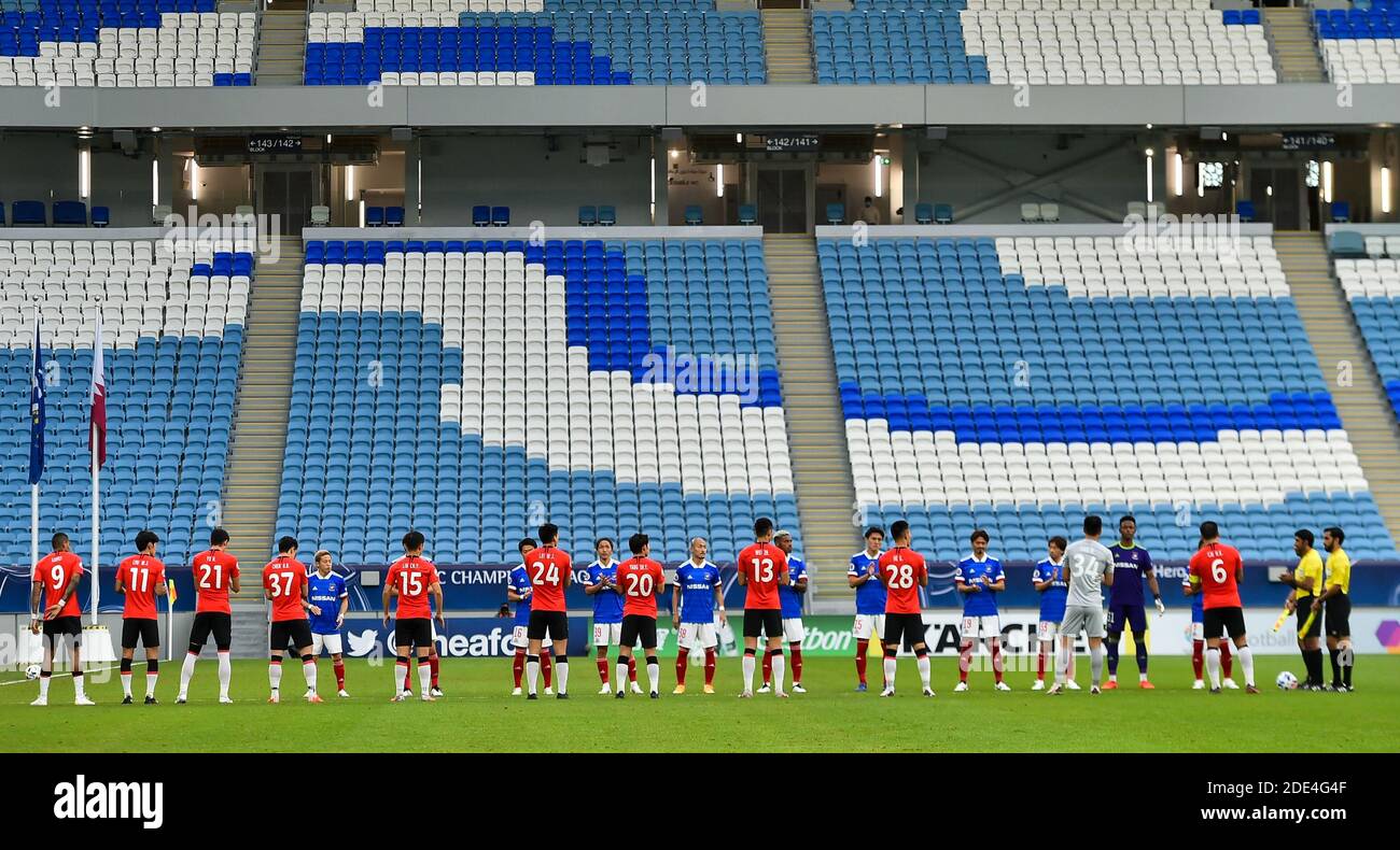 Doha, Qatar. 28th Nov, 2020. Players and referees stand before the AFC ...