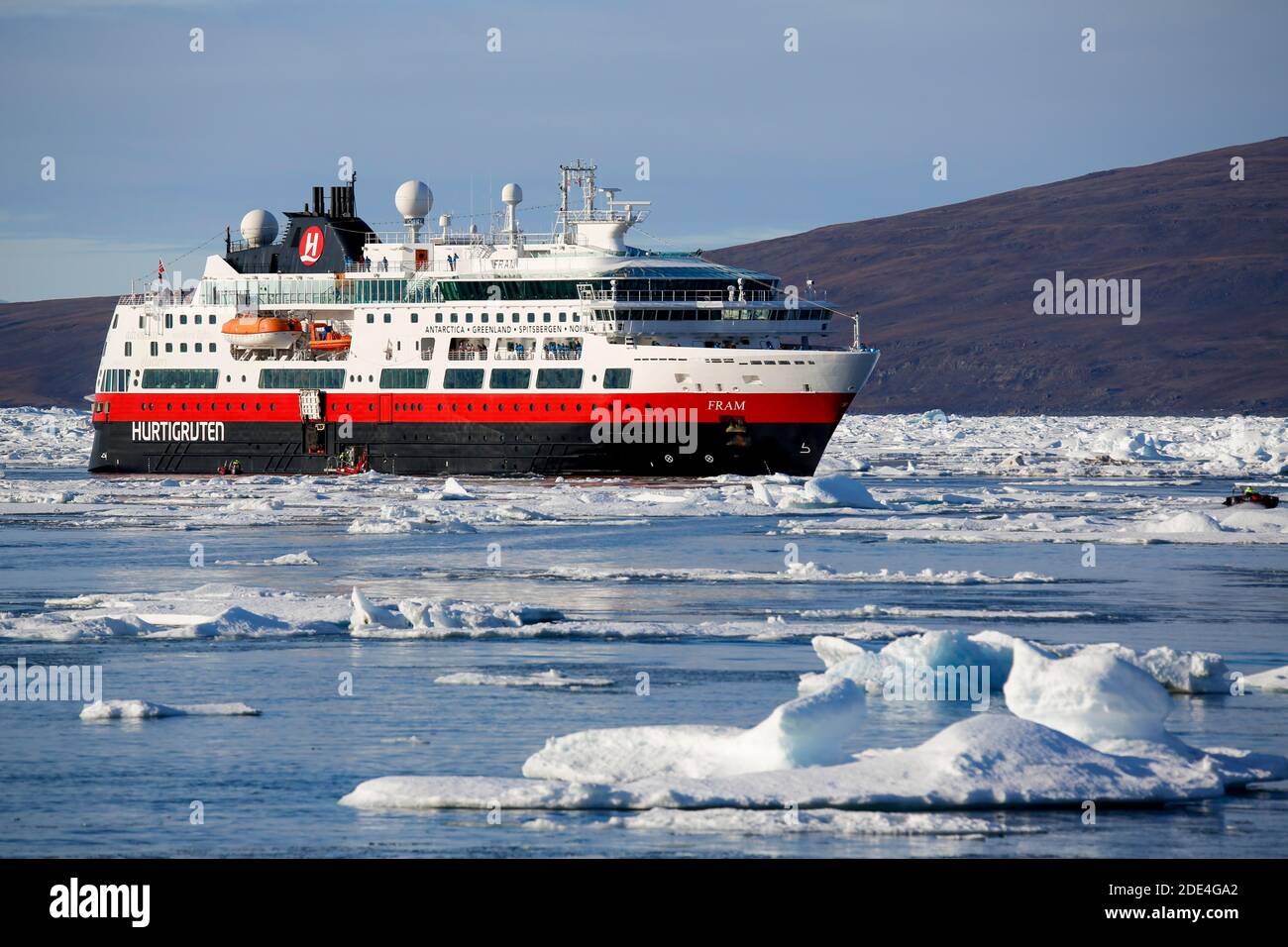 Cruise ship in ice field, east coast of Greenland, Denmark Stock Photo ...