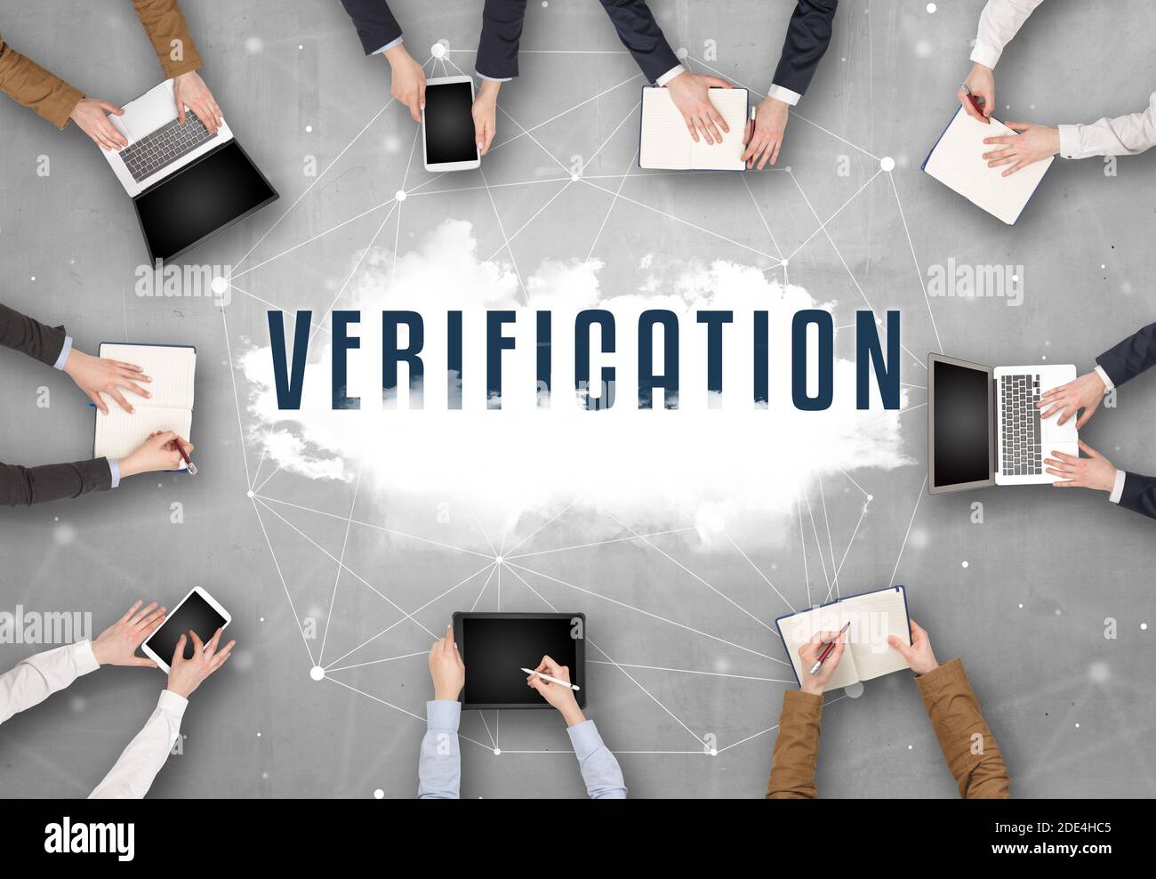 Group of people having a meeting with VERIFICATION insciption, web ...