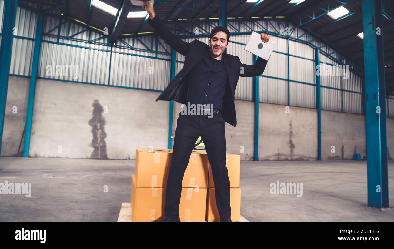 Funny factory workers dance in the factory . Happy people at work Stock ...