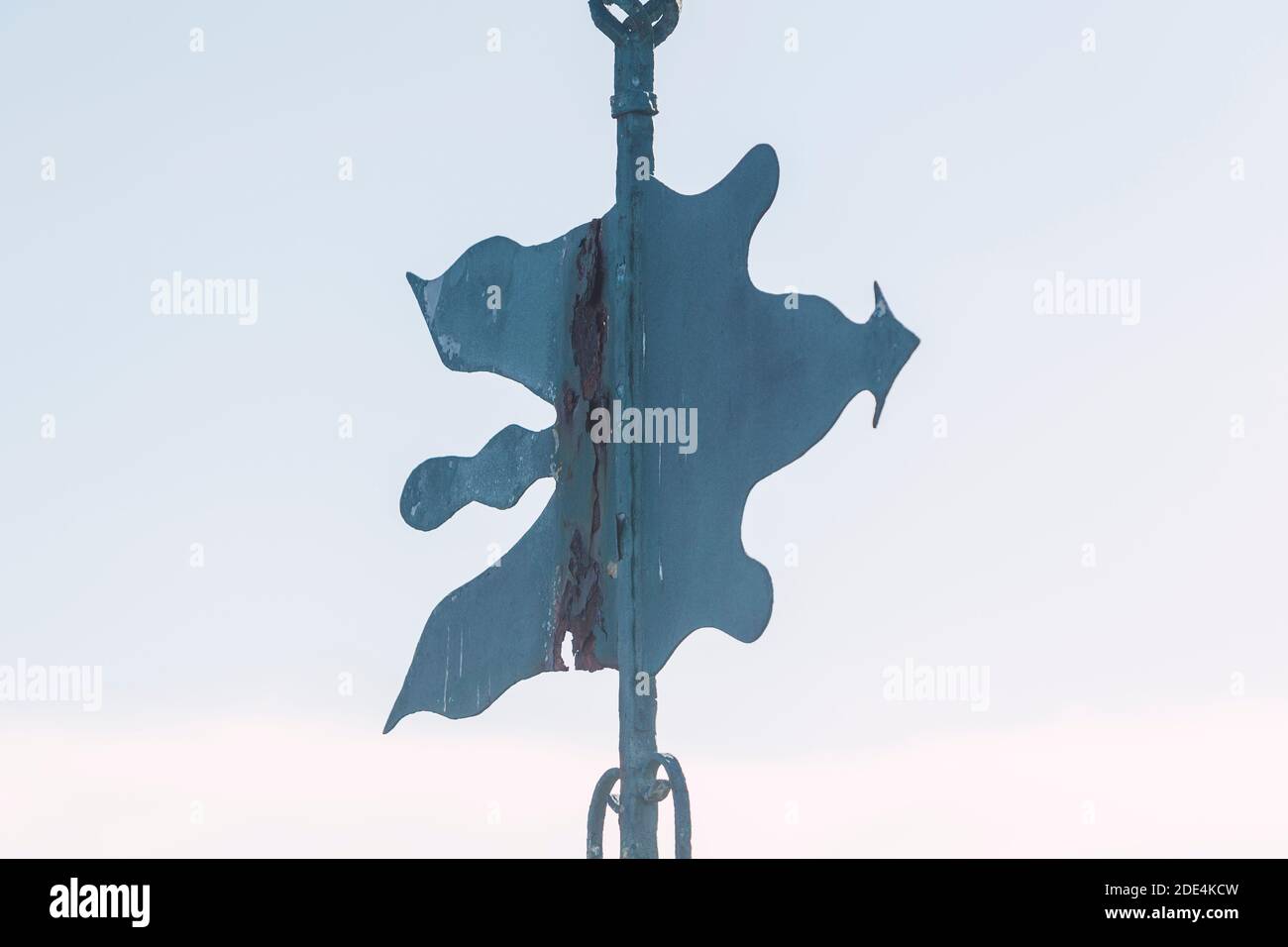 green signpost of wind direction on sky background Stock Photo - Alamy