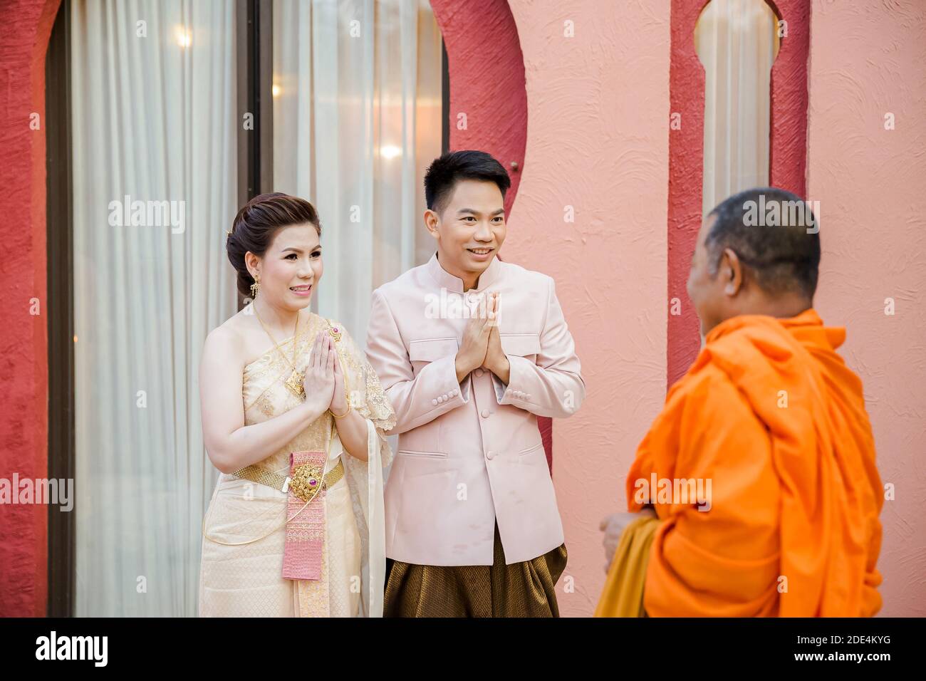 Novenber 11, 2020 - Hua Hin, Thailand : A Thai couple is making merit ...