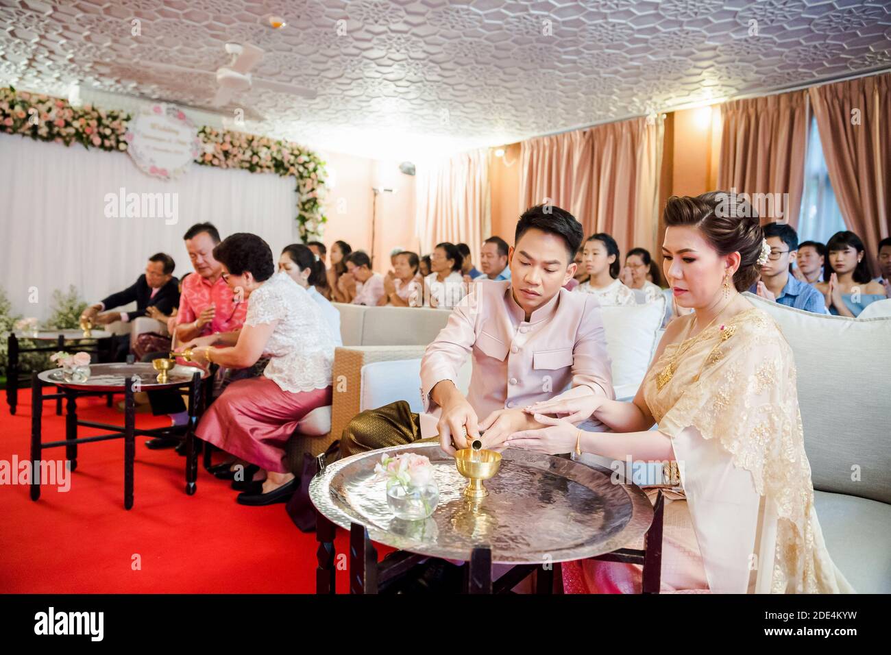 Novenber 11, 2020 - Hua Hin, Thailand : A Thai couple is making merit ...