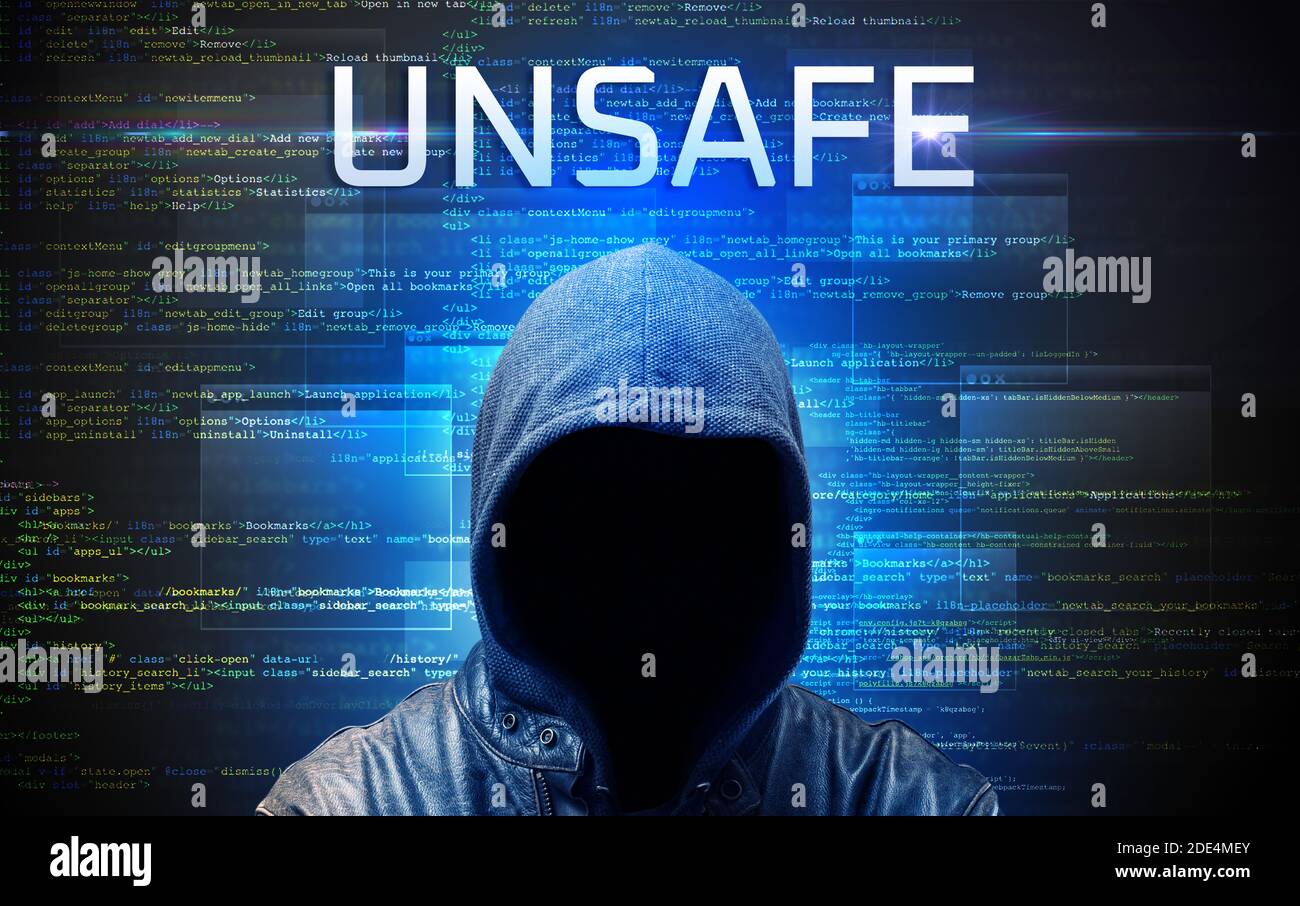 Faceless hacker with UNSAFE inscription on a binary code background ...