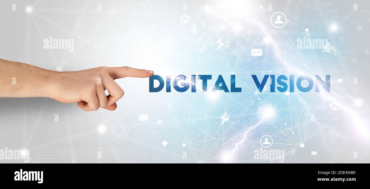 Hand pointing at DIGITAL VISION inscription, modern technology concept ...