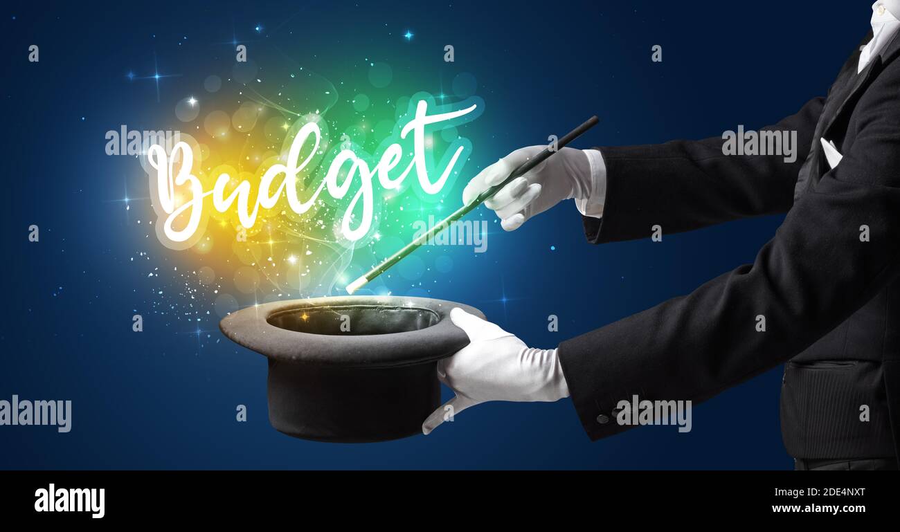 Magician hand conjure with wand and Budget inscription, shopping ...