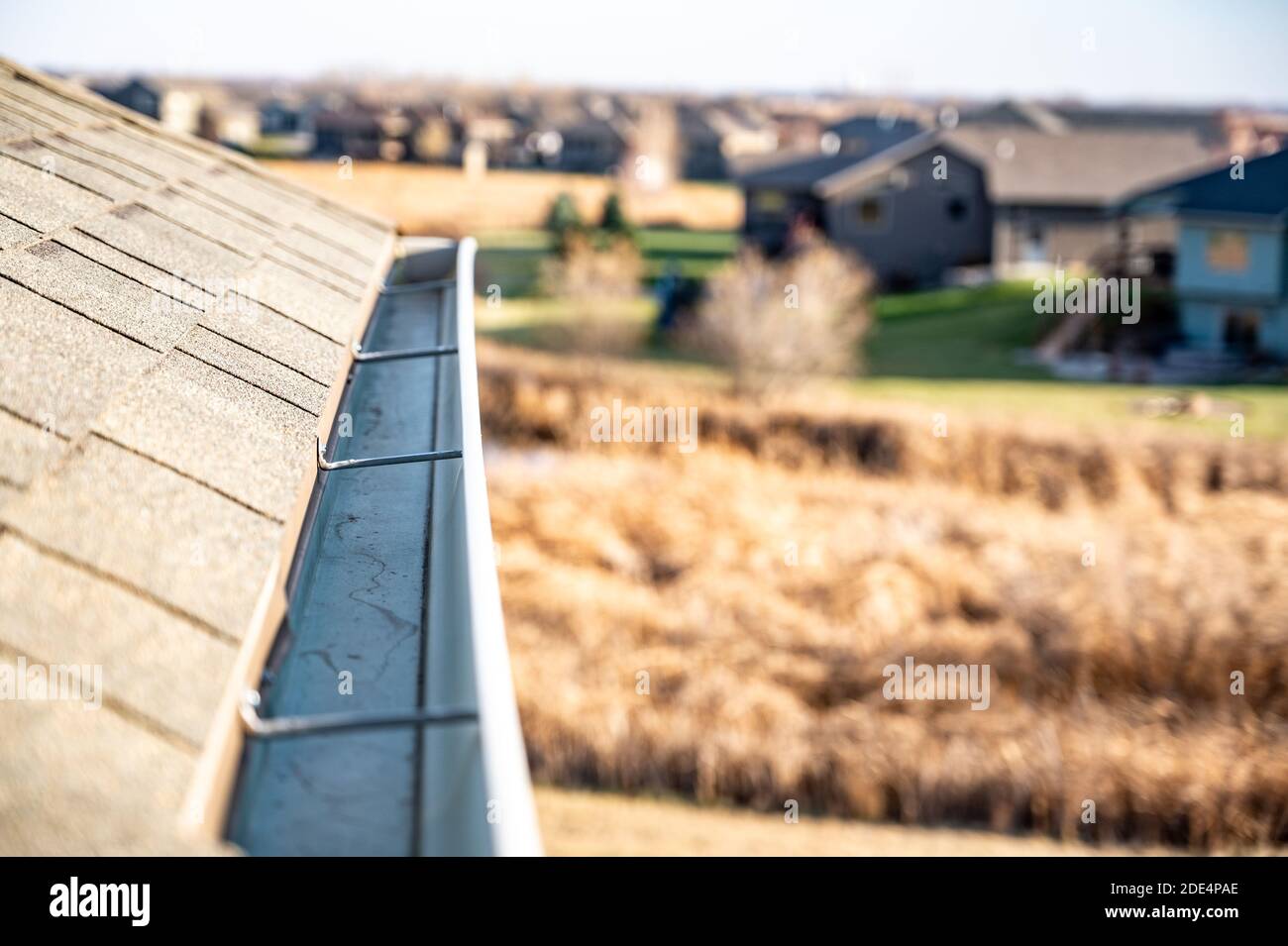 roof siding and gutter Stock Photo - Alamy
