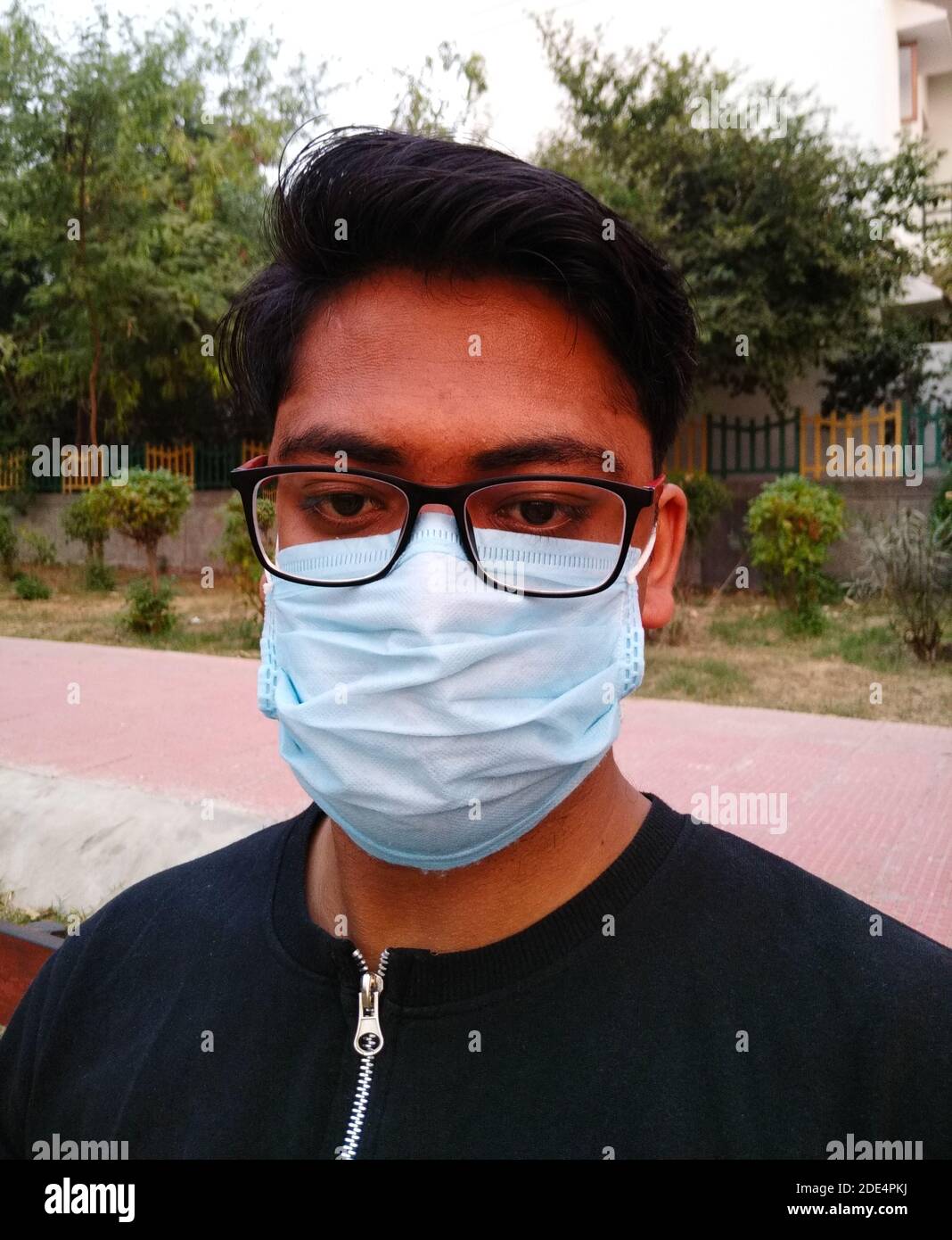 Beautiful young boy model wear a mask to avoid corona virus Stock Photo ...