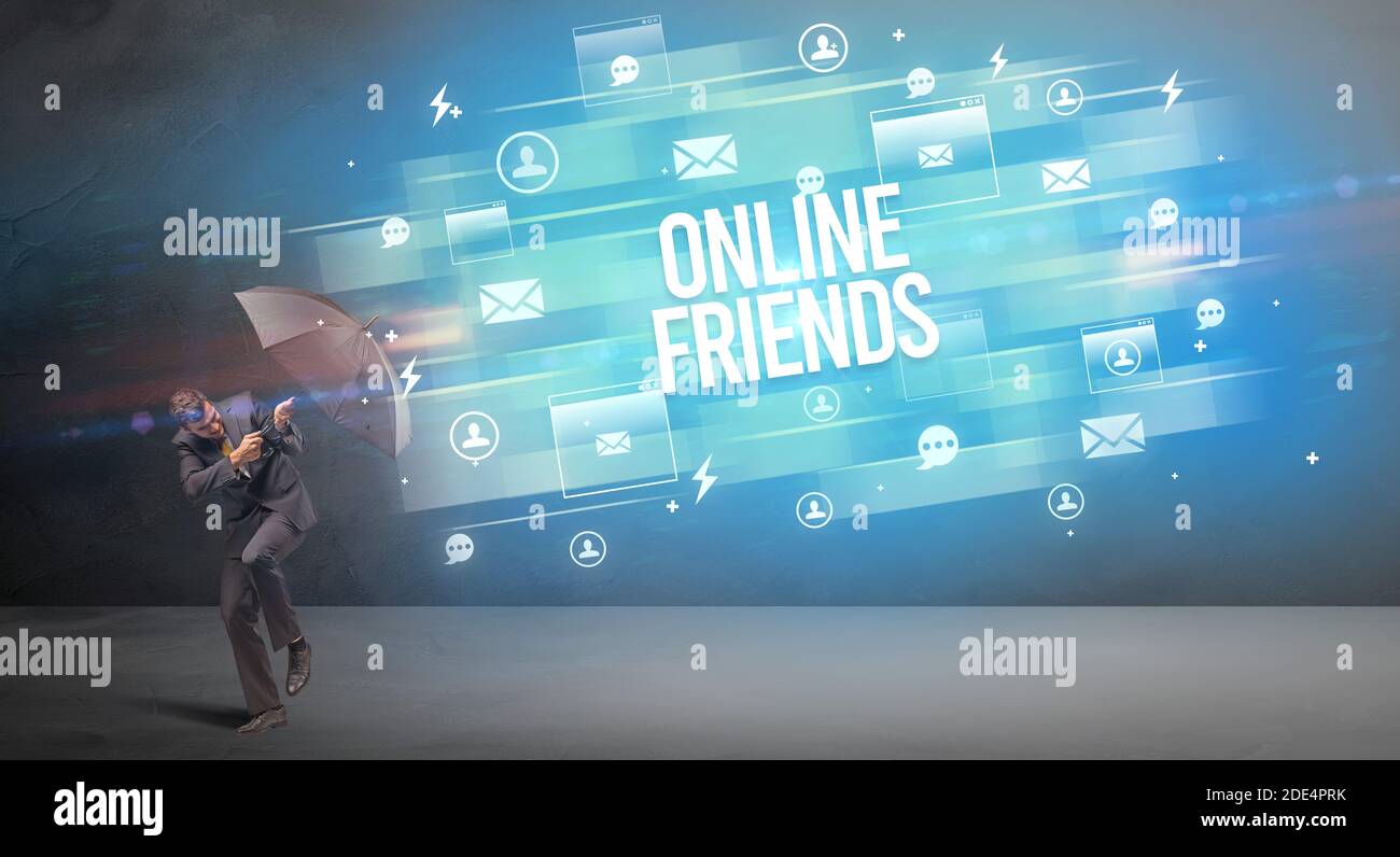 Handsome businessman defending with umbrella from ONLINE FRIENDS ...