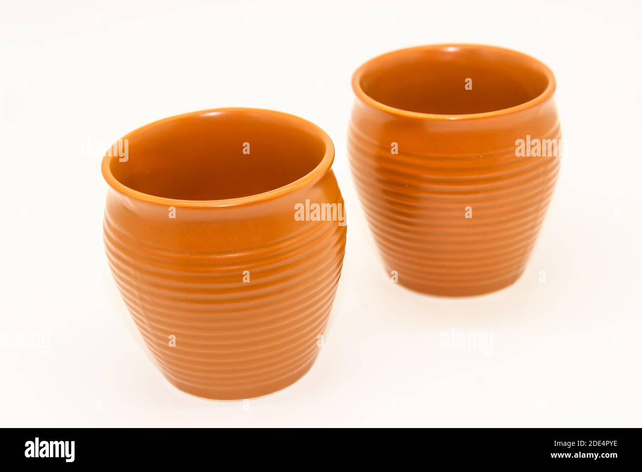 A picture of soil tea cup isolated on white background Stock Photo - Alamy