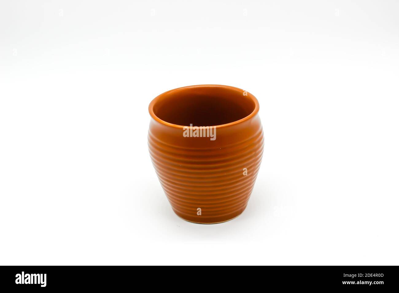 A picture of soil tea cup isolated on white background Stock Photo - Alamy