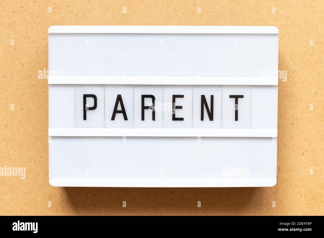 Lightbox with word parent on wood background Stock Photo - Alamy