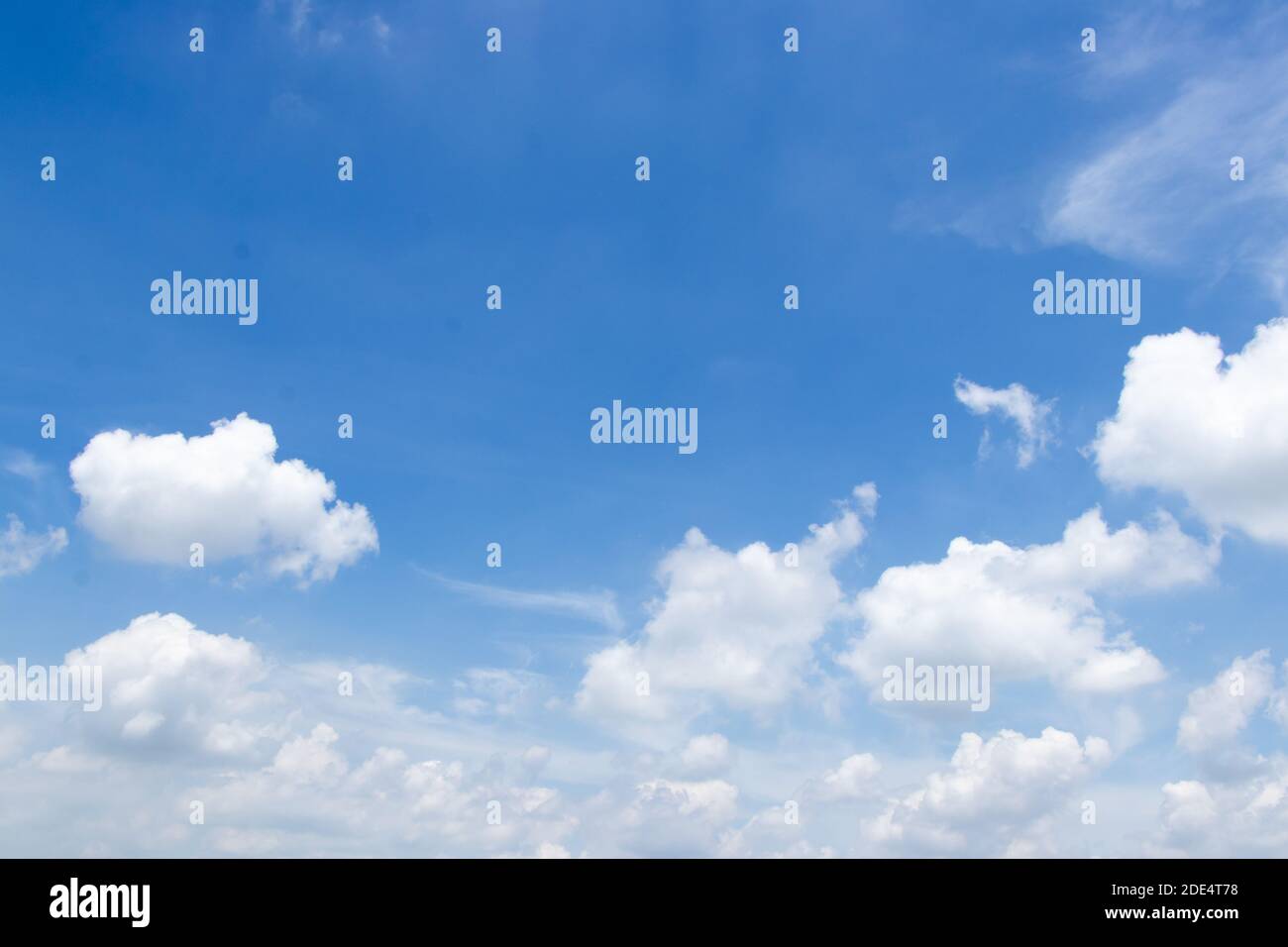 Clear blue color sky with white cloud background Stock Photo - Alamy