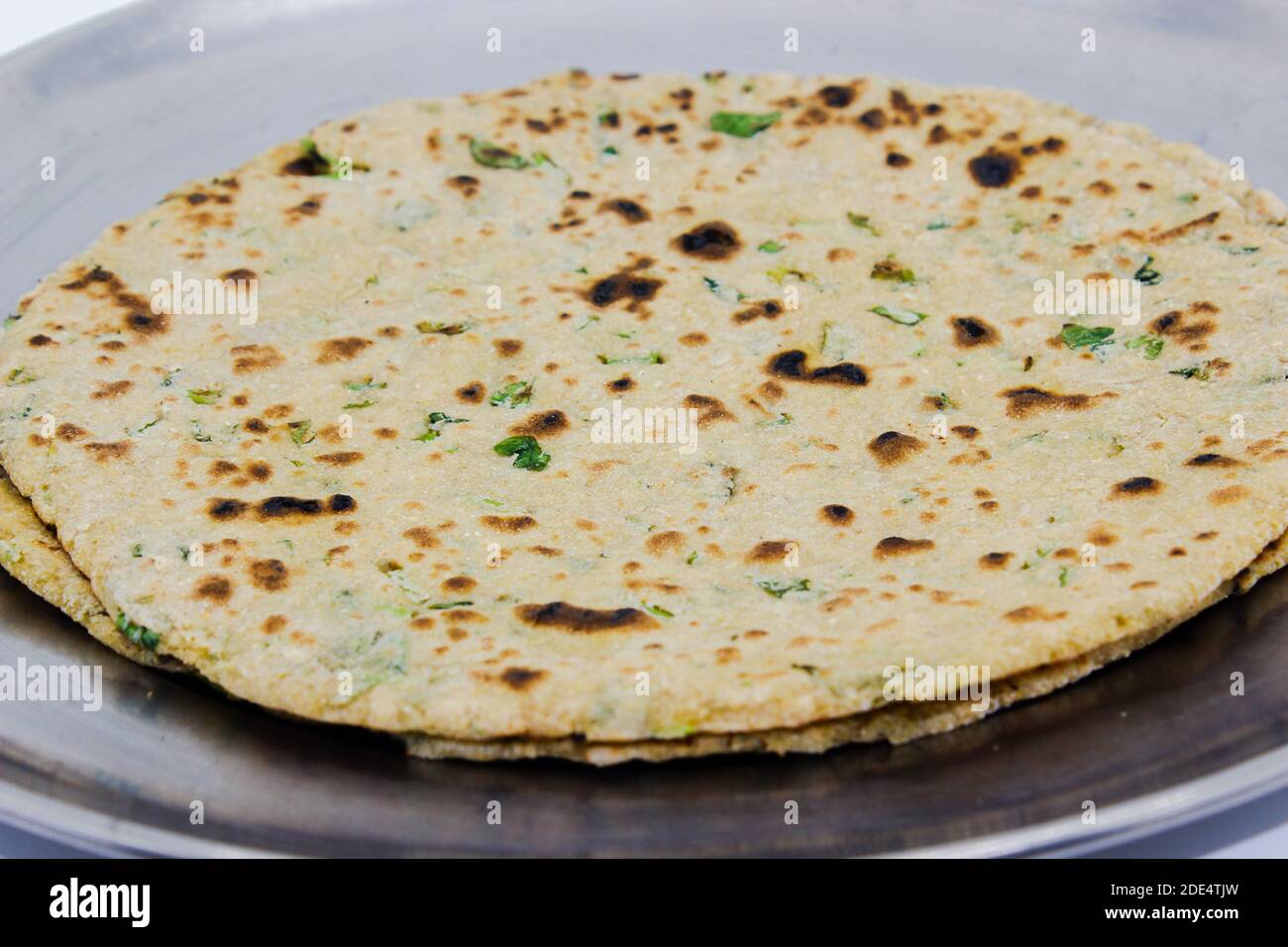 A picture of chapati isolated on white background Stock Photo - Alamy