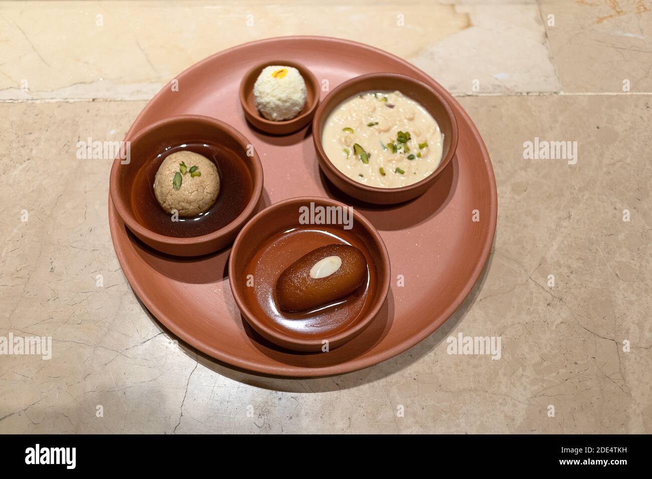 Bengali sweets hi-res stock photography and images - Alamy