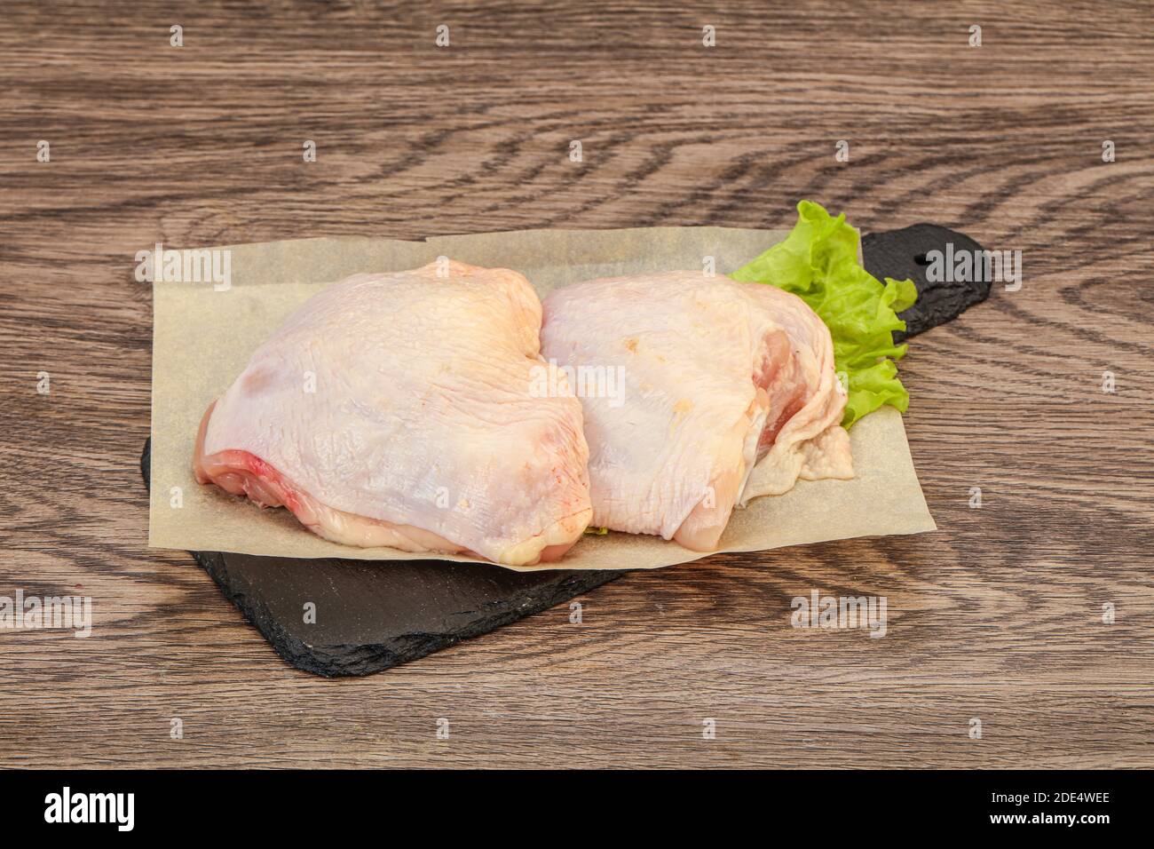 Raw chicken hip ready for cooking Stock Photo - Alamy