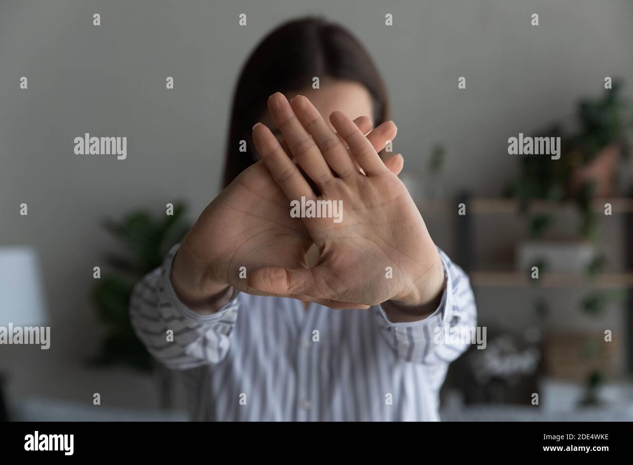 Confident woman protest show stop hand gesture Stock Photo - Alamy