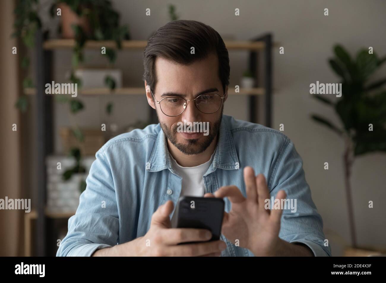 Caucasian man using hi-res stock photography and images - Alamy