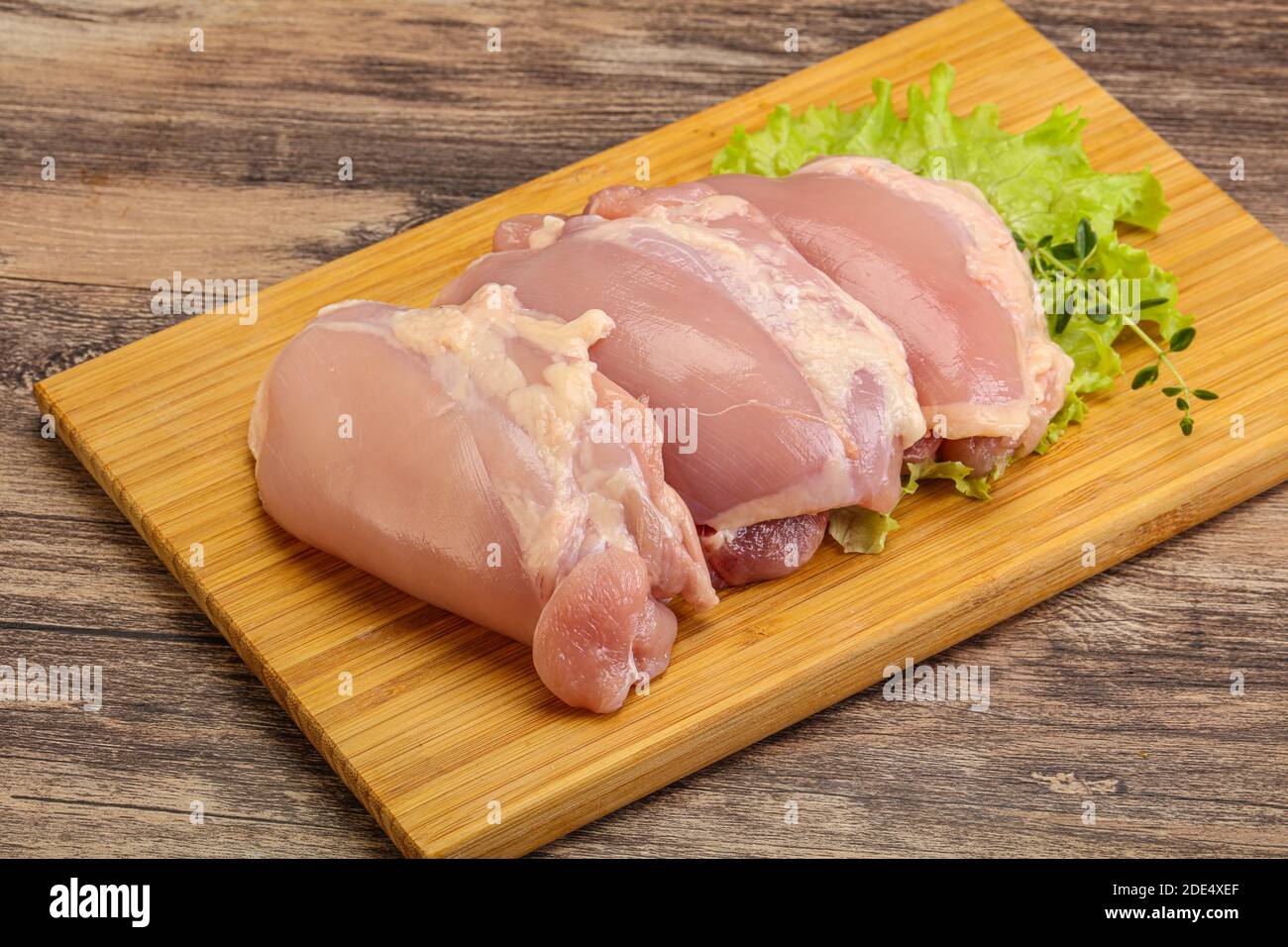 Raw chicken boneless and skinless leg for cooking Stock Photo - Alamy