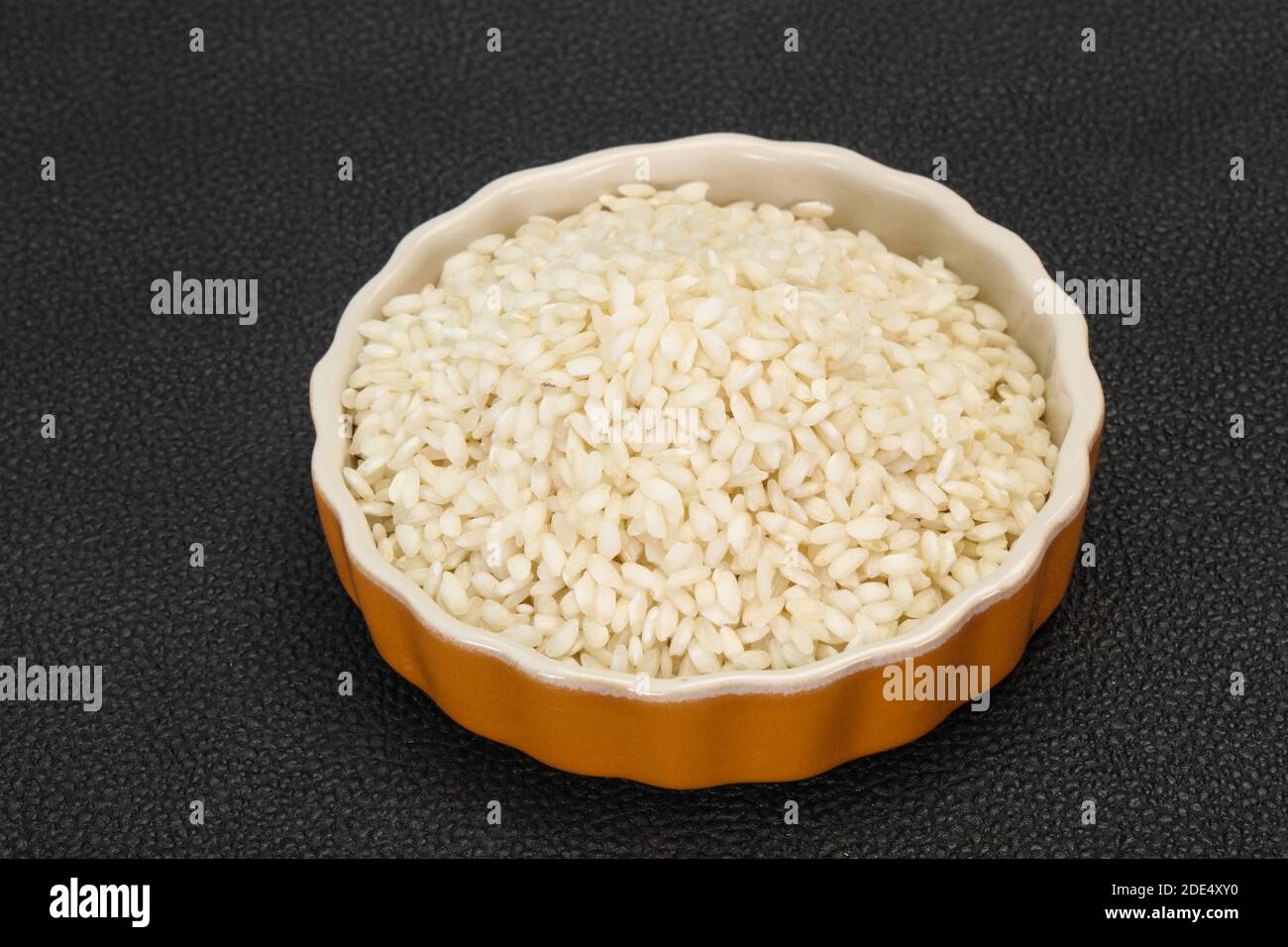 Raw Arborio rice for Italian risotto Stock Photo - Alamy