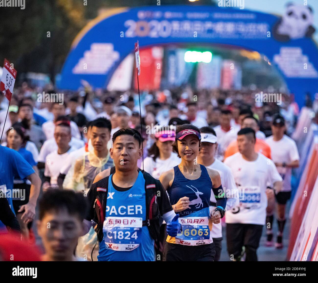 Chengdu, China's Sichuan Province. 29th Nov, 2020. Runners compete ...