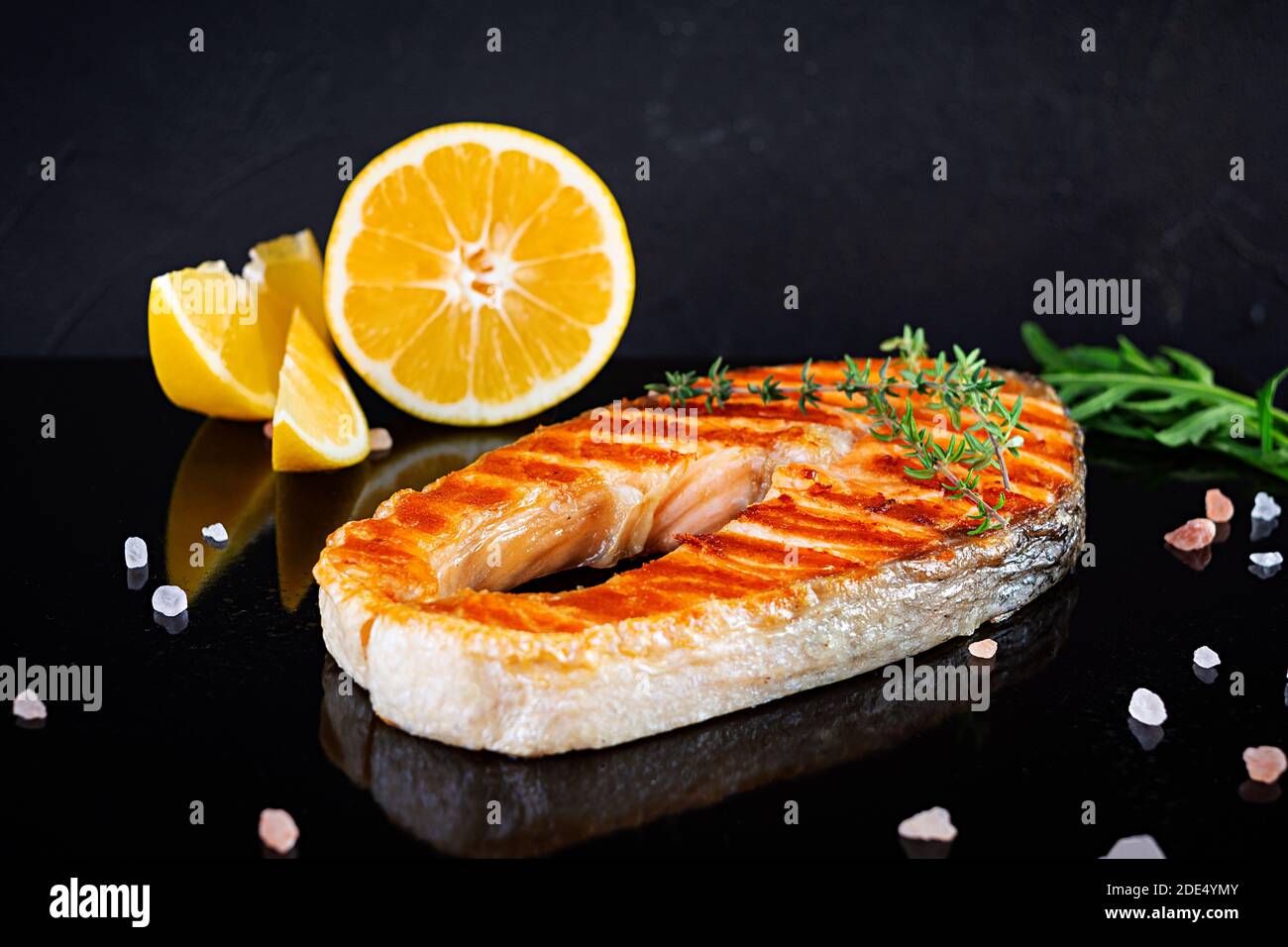 Grilled salmon fish on stone board. Salt atlantic salmon fried on grill ...