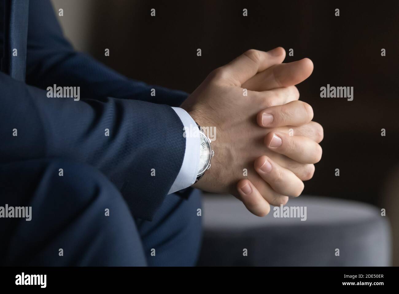 Clasped fingers hi-res stock photography and images - Alamy
