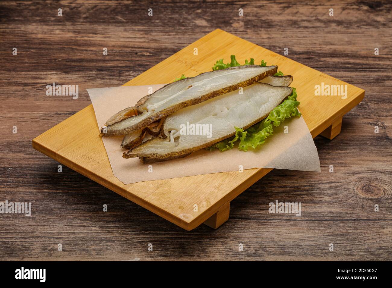 Delicous smoked halibut fish slices snack Stock Photo - Alamy