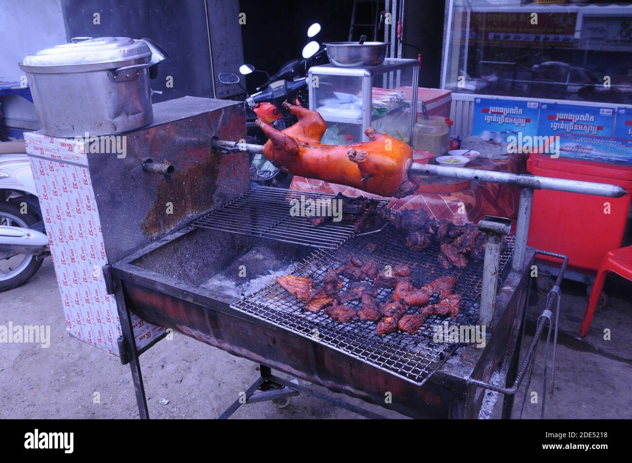 Asian eating dog meat hi-res stock photography and images - Alamy